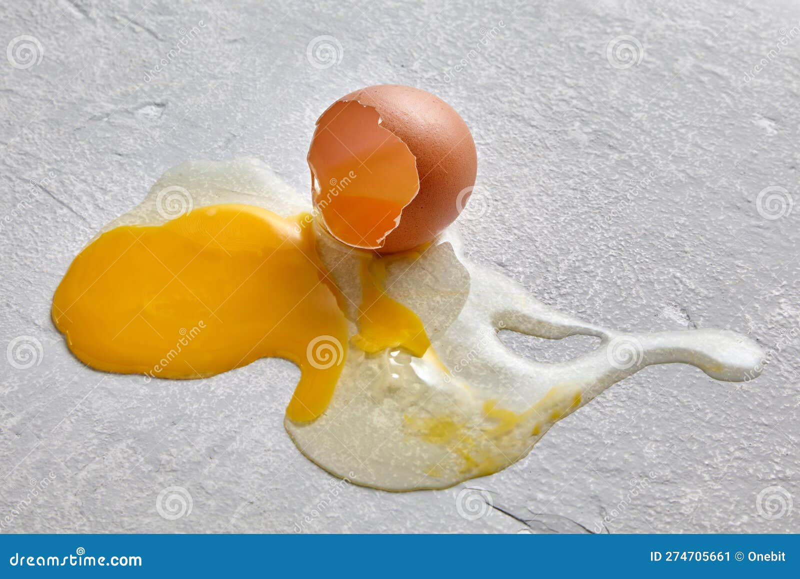 The Smashed Chicken Egg Splattered Across the Concrete Floor Stock ...