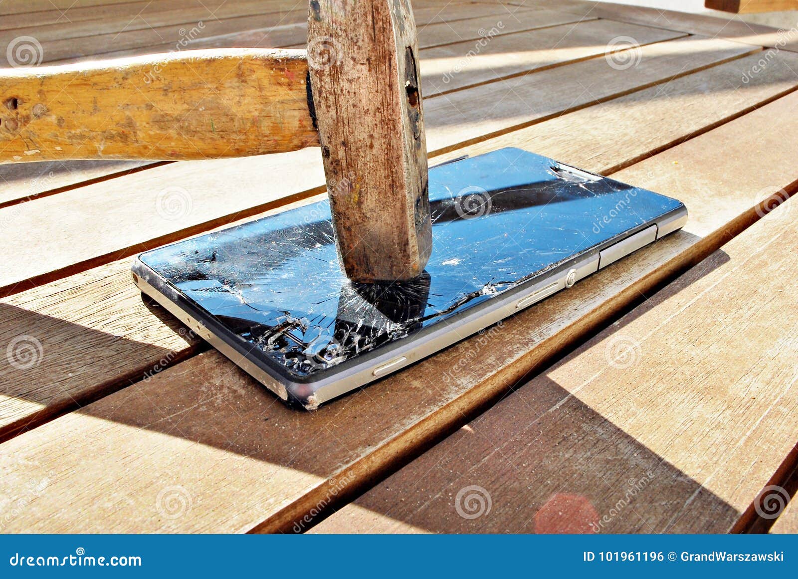 Smashed Phone Screen on a Table with a Hammer Stock Photo - Image of ...