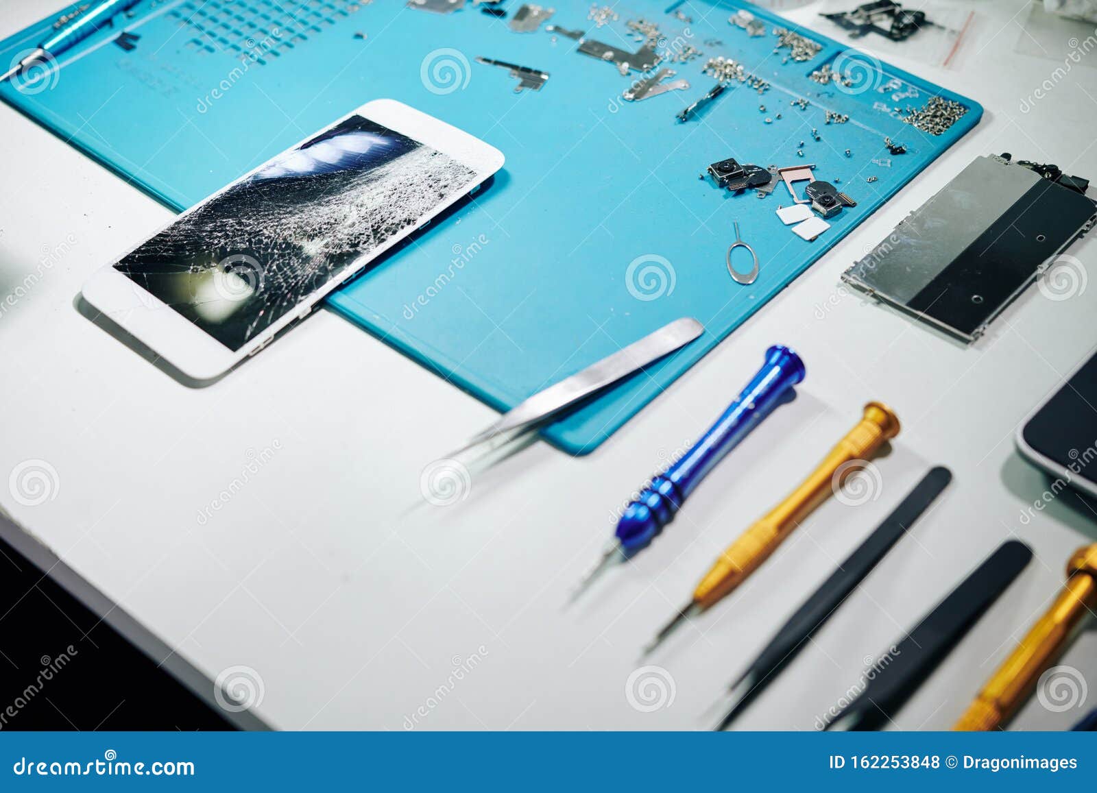 Smashed Smartphone of Desk of Repairman Stock Photo - Image of modern ...