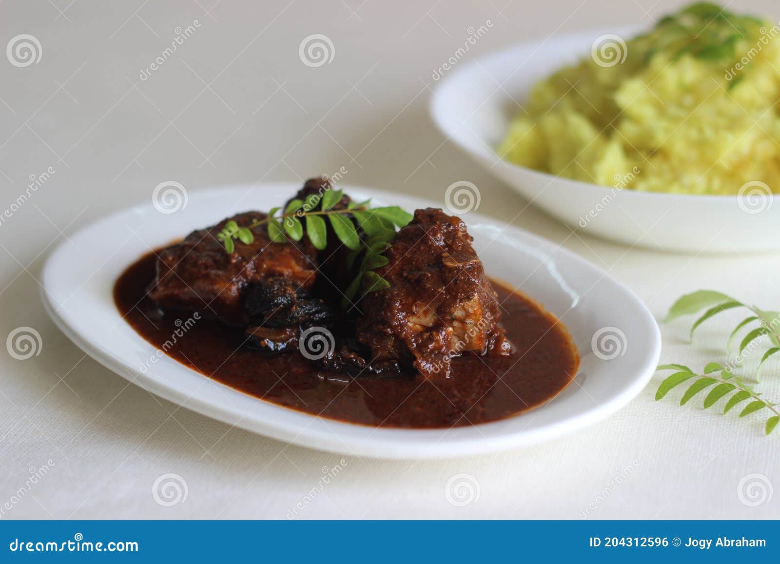 Mashed Tapioca Served With Pomfret Fish Curry. Boiled And Strained ...
