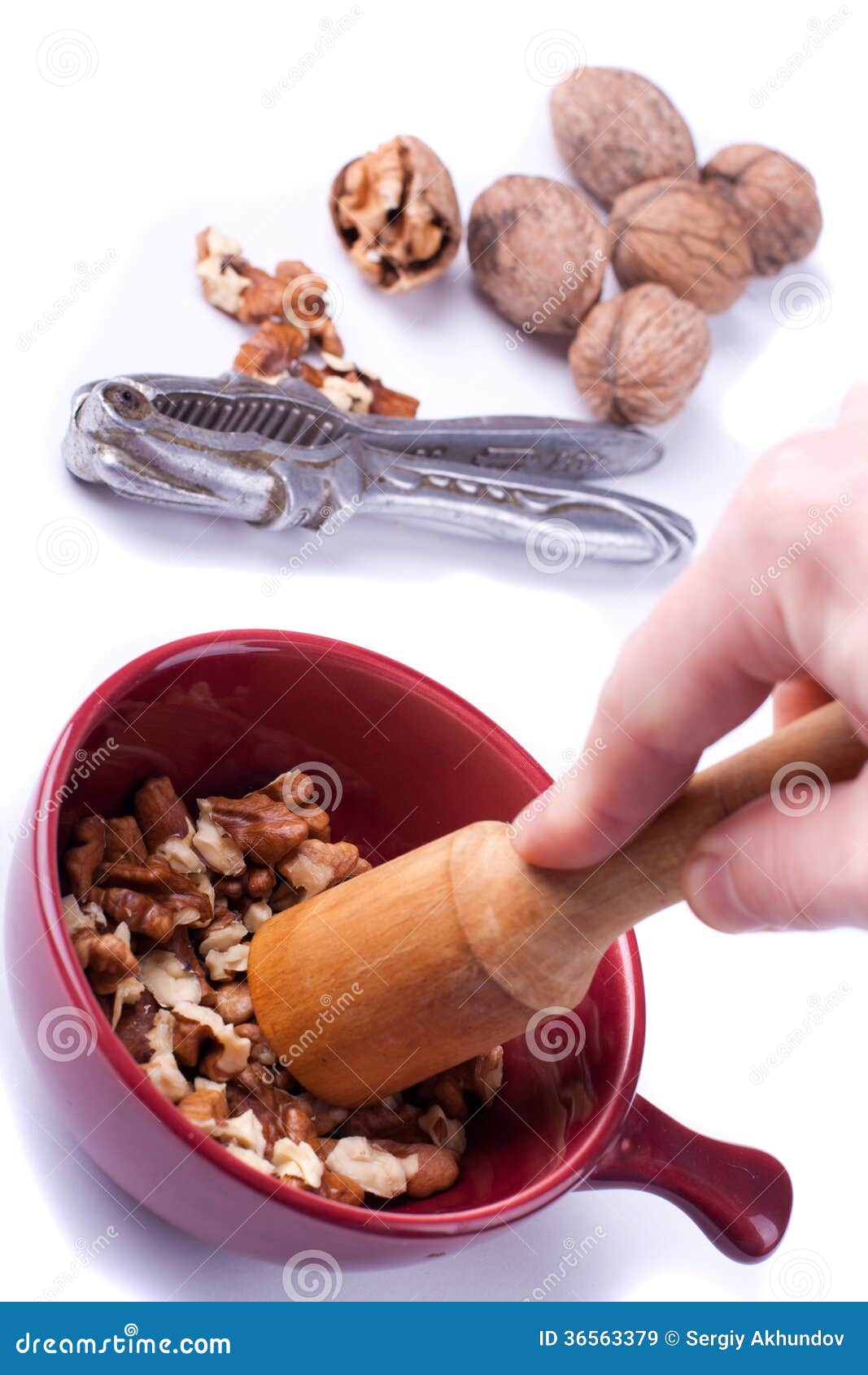 Smashing wallnuts stock image. Image of foreground, alternatives - 36563379