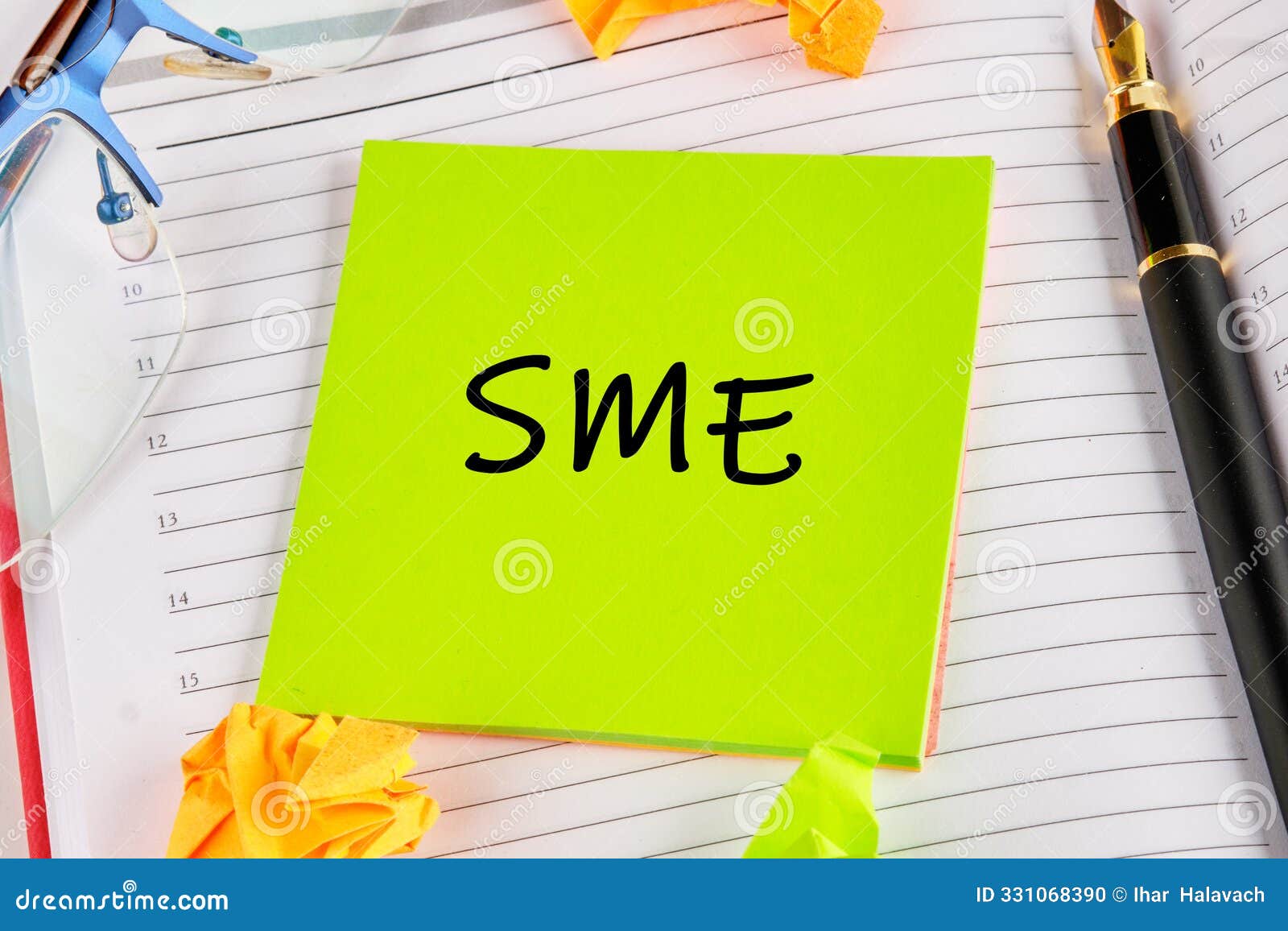 SME, Small and Medium Enterprise. on a Light Green Sticker Lying on the ...