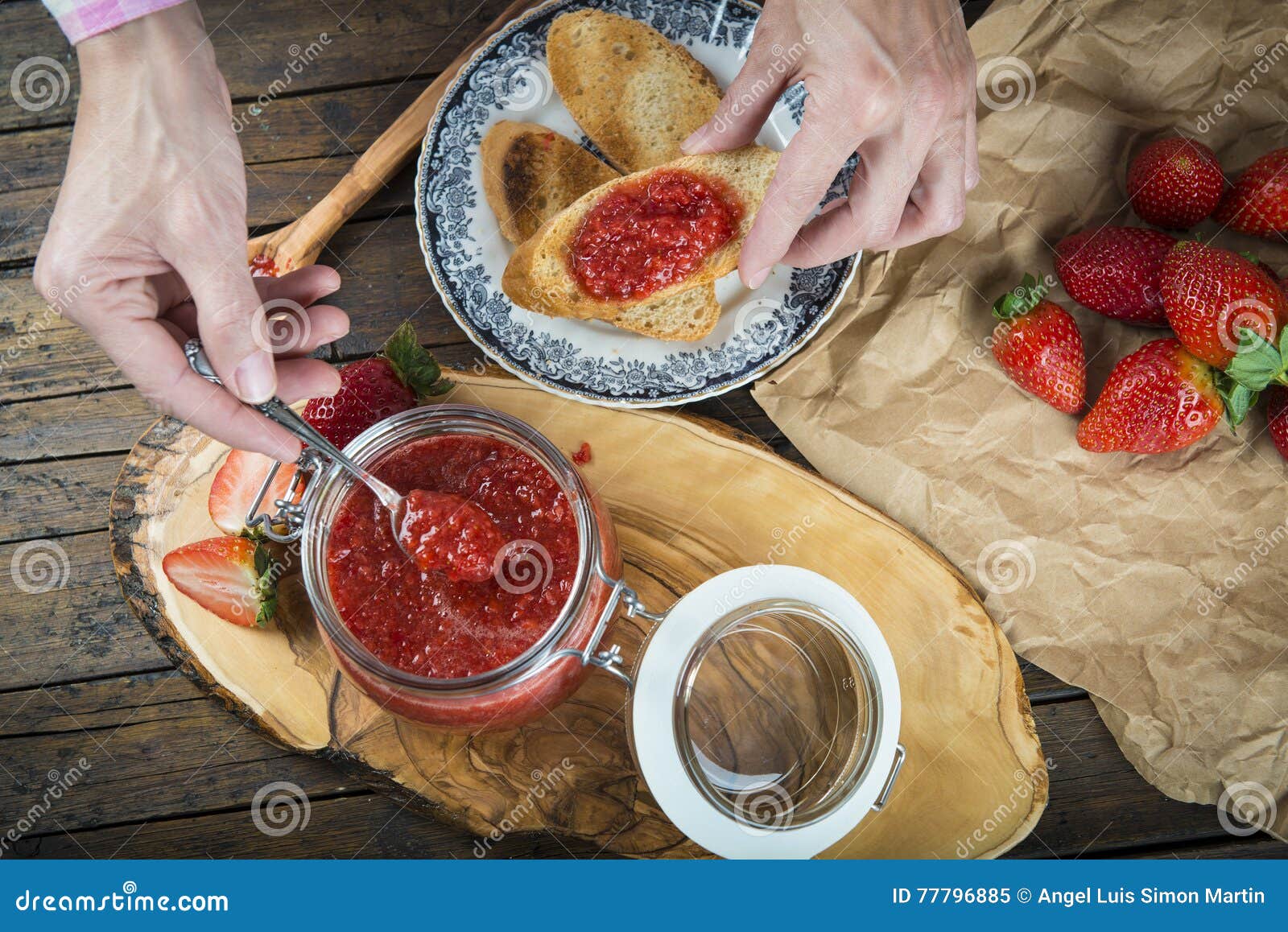 Smearing Strawberry Jam on a Toast for Breakfast Stock Image - Image of ...