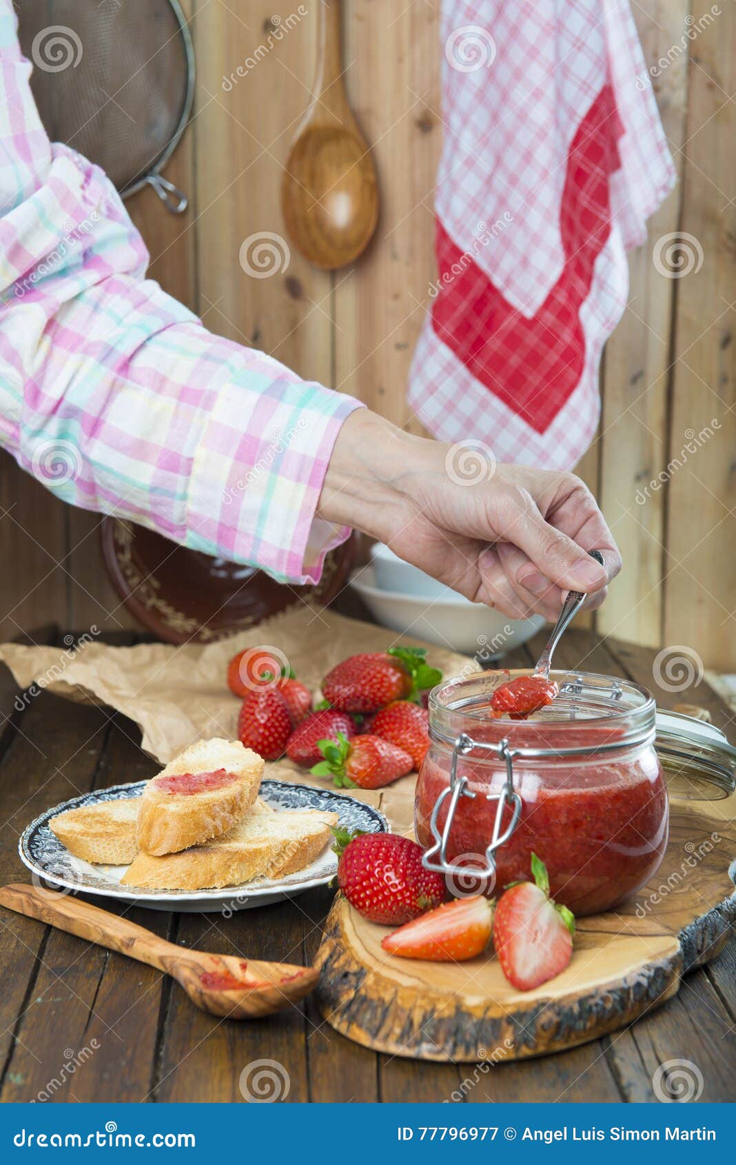 Smearing Strawberry Jam on a Toast for Breakfast Stock Image - Image of ...