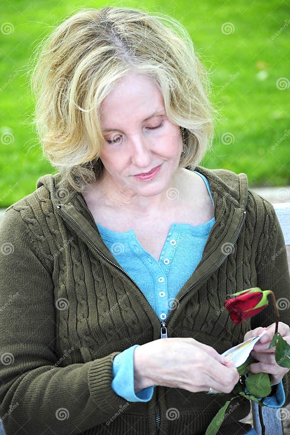 Smell of a rose. stock photo. Image of outdoors, flowers - 5707352