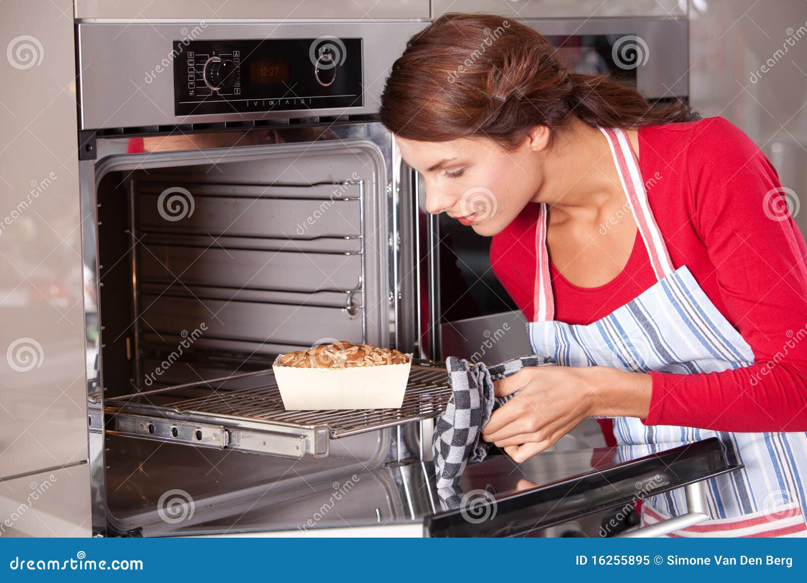 Smelling the cake stock image. Image of looking, brunette - 16255895