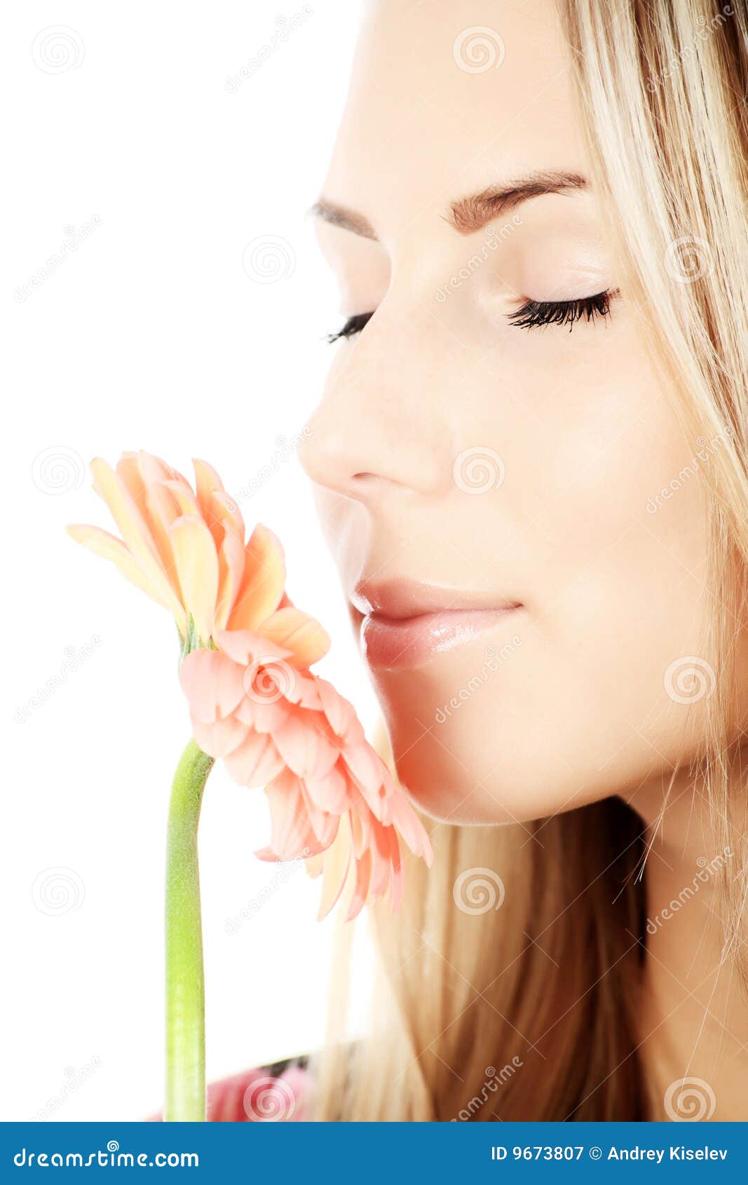 Smelling a flower stock image. Image of female, attractive - 9673807