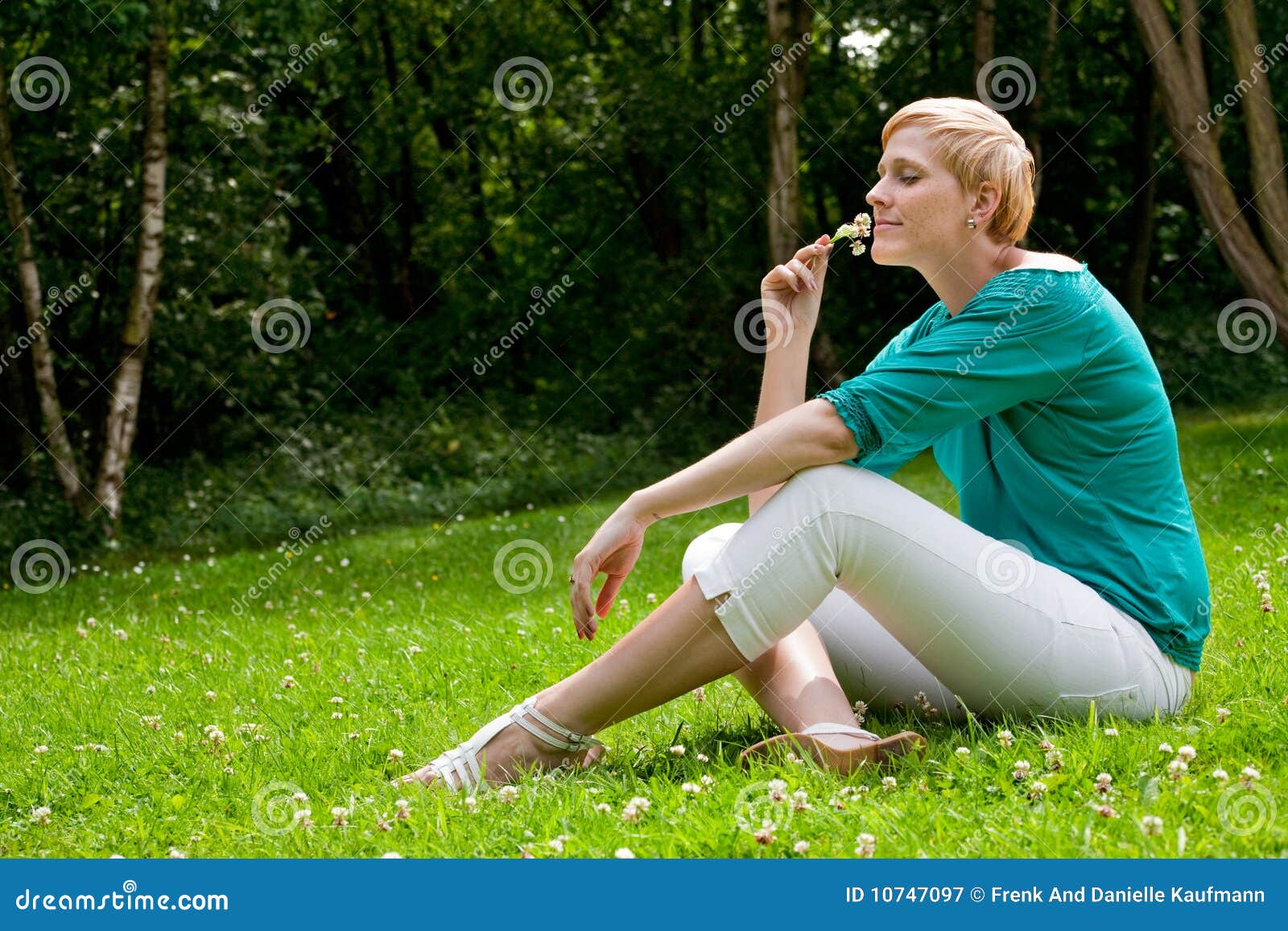 Smelling a Flower on the Grass Stock Image - Image of girl, healthy ...