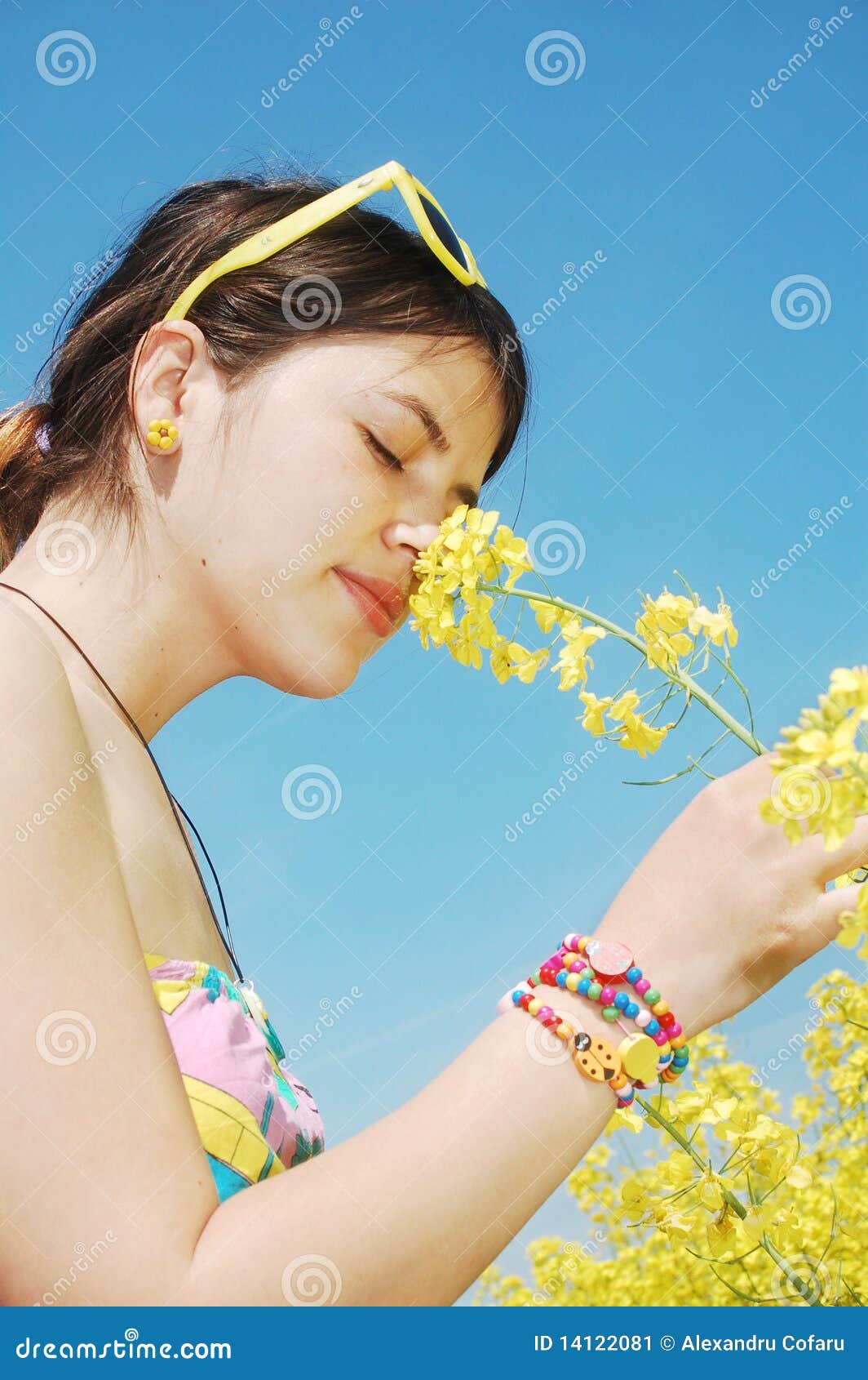 Smelling flowers stock image. Image of blossoming, hold - 14122081