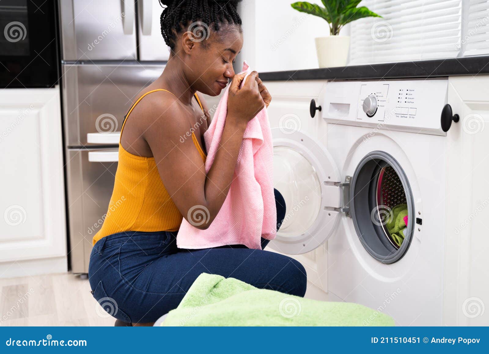 Smelling Washed Clothes or Laundry Stock Image - Image of black ...