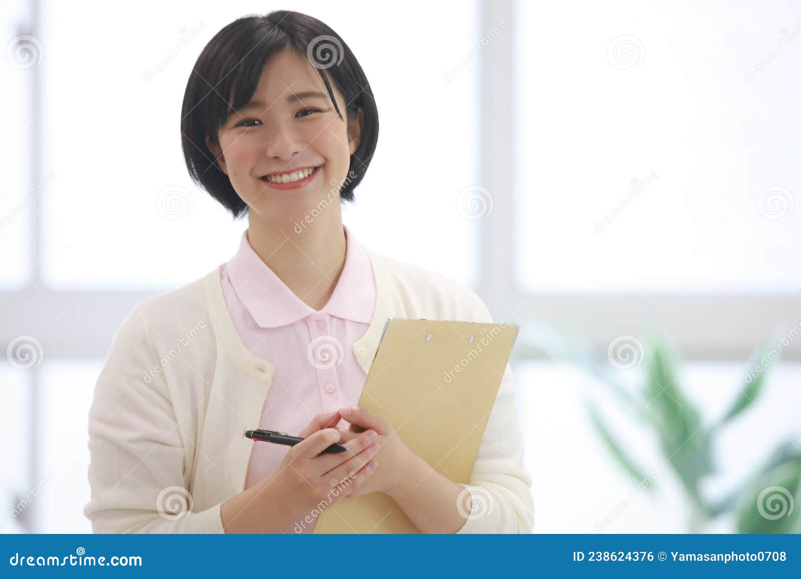 Smile Caregiver with Binder Stock Photo - Image of health, conversation ...