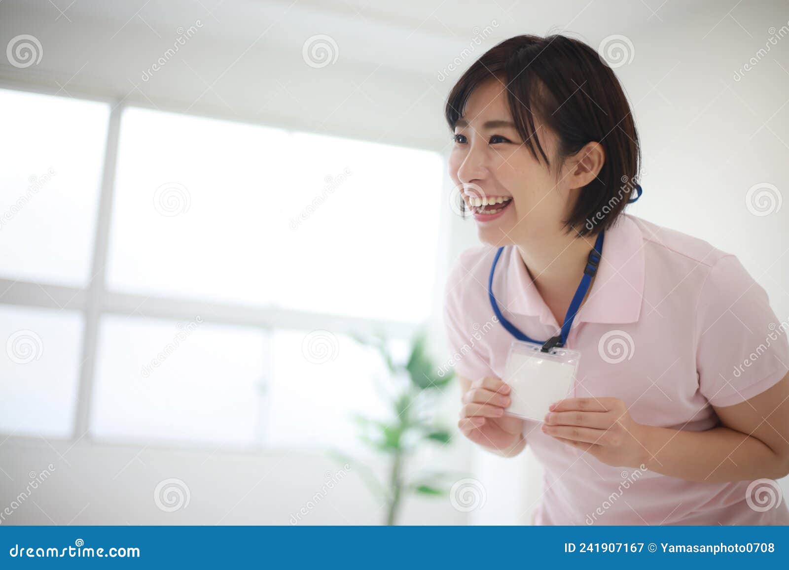 Smile female caregiver stock image. Image of indoors - 241907167