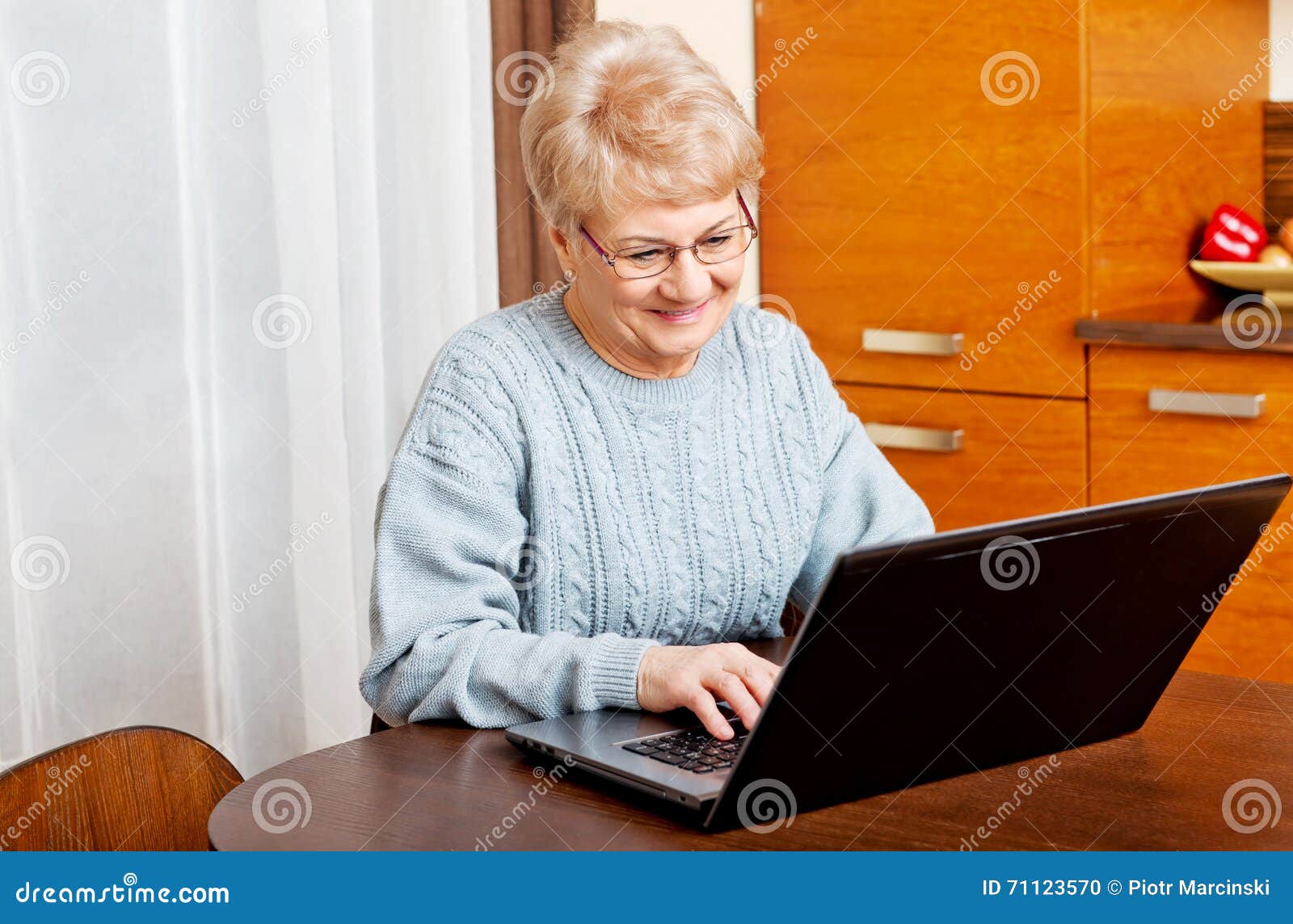 Smile Senior Sitting at Table and Using Laptop Stock Photo - Image of ...