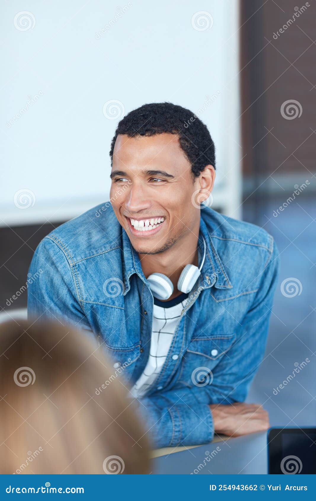 The Smile of a Successful Student. a Young University Student Sitting ...