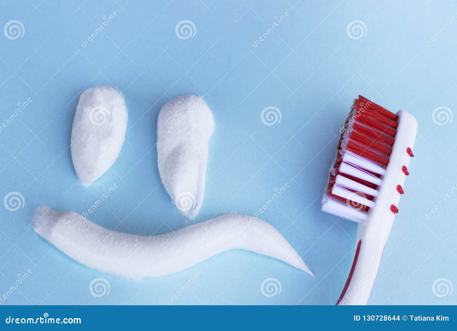 Smile from Toothpaste and Toothbrush on a Blue Background Stock Photo ...