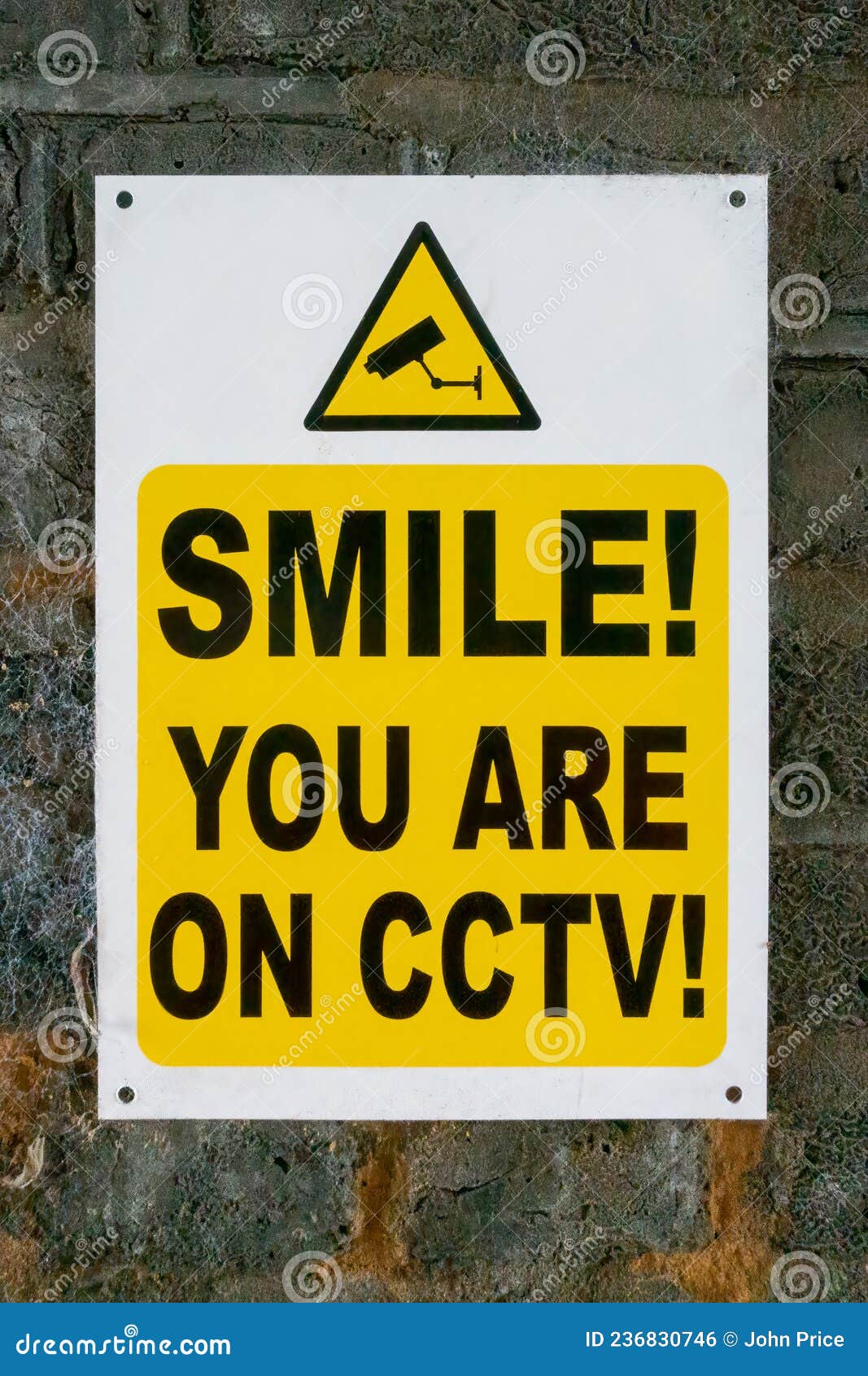 Smile you are on CCTV sign stock photo. Image of wall - 236830746