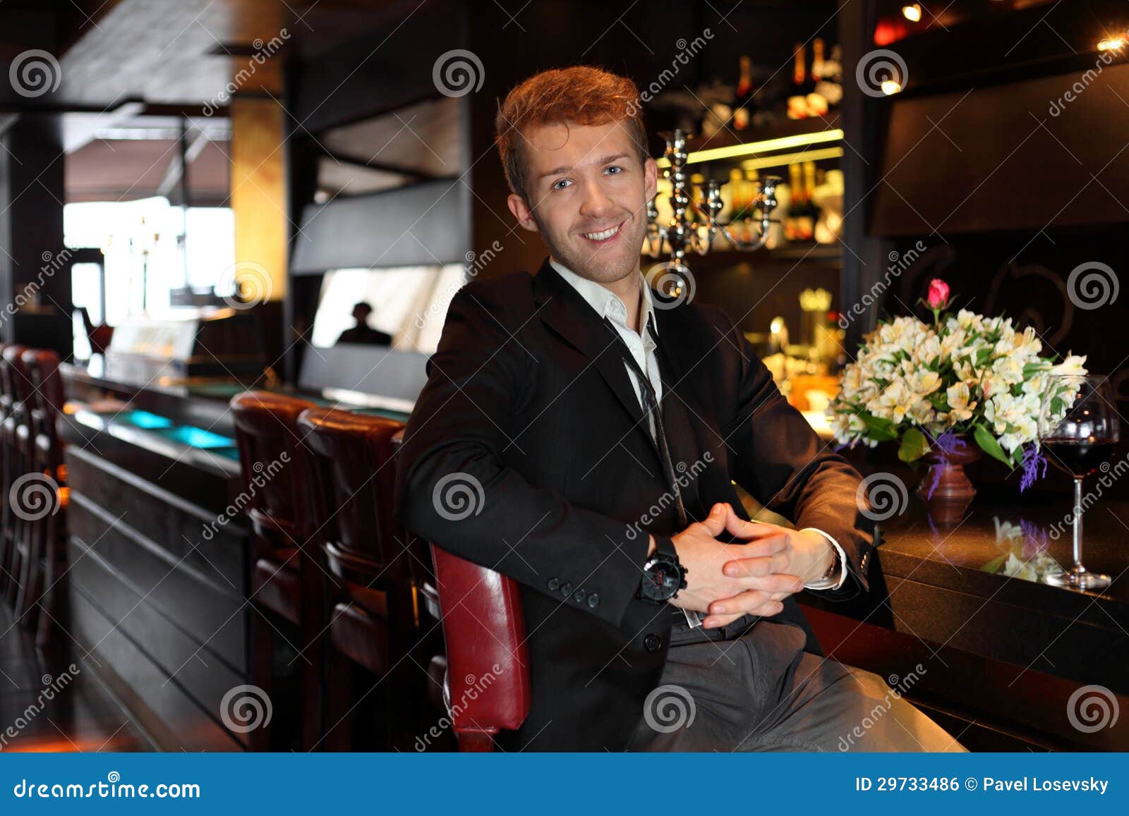 Smile Man in a Black Suit at the Bar Stock Photo - Image of sitting ...