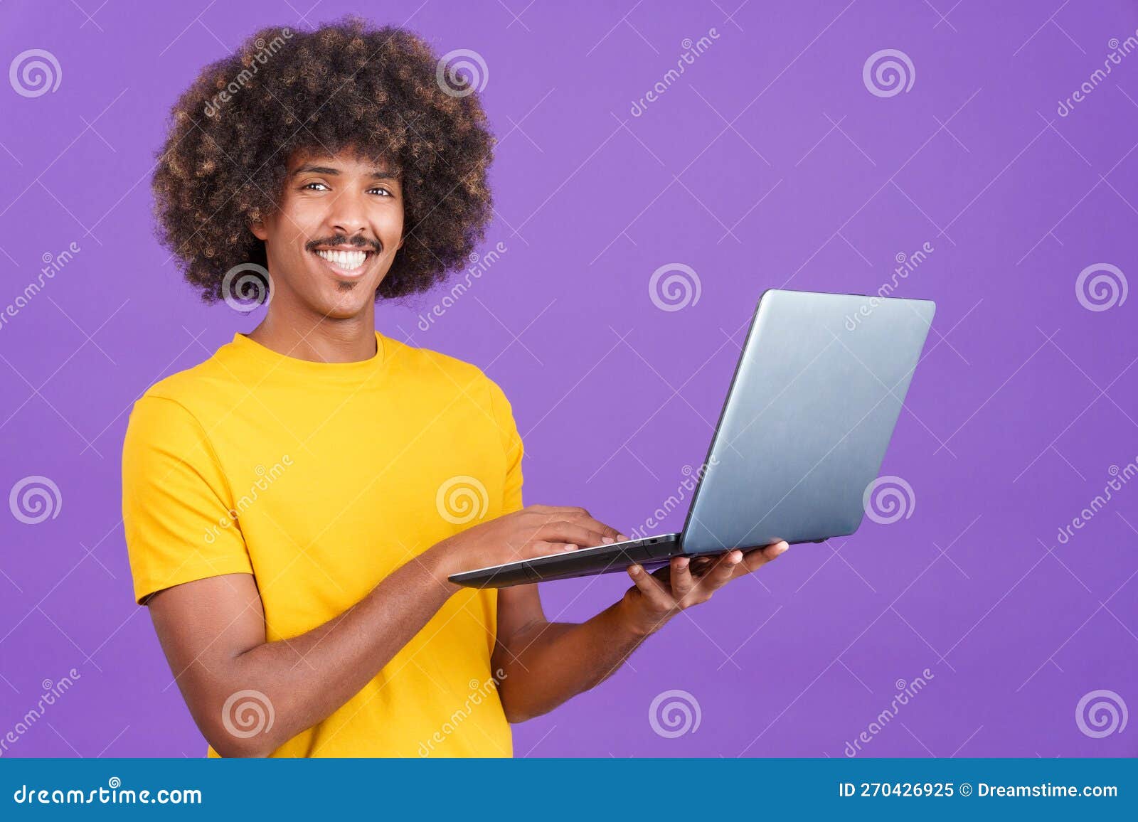 Smiley African Man Standing and Using a Laptop Stock Image - Image of ...