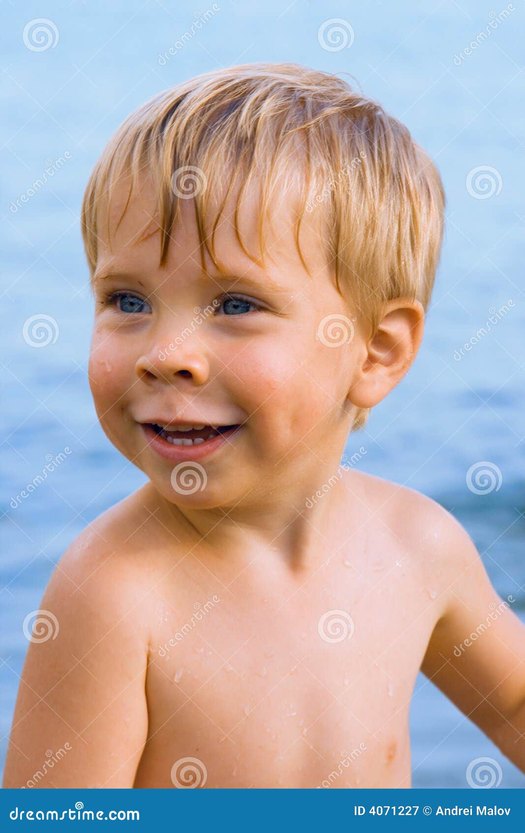 Smiley boy at water stock image. Image of activity, lifestyle - 4071227