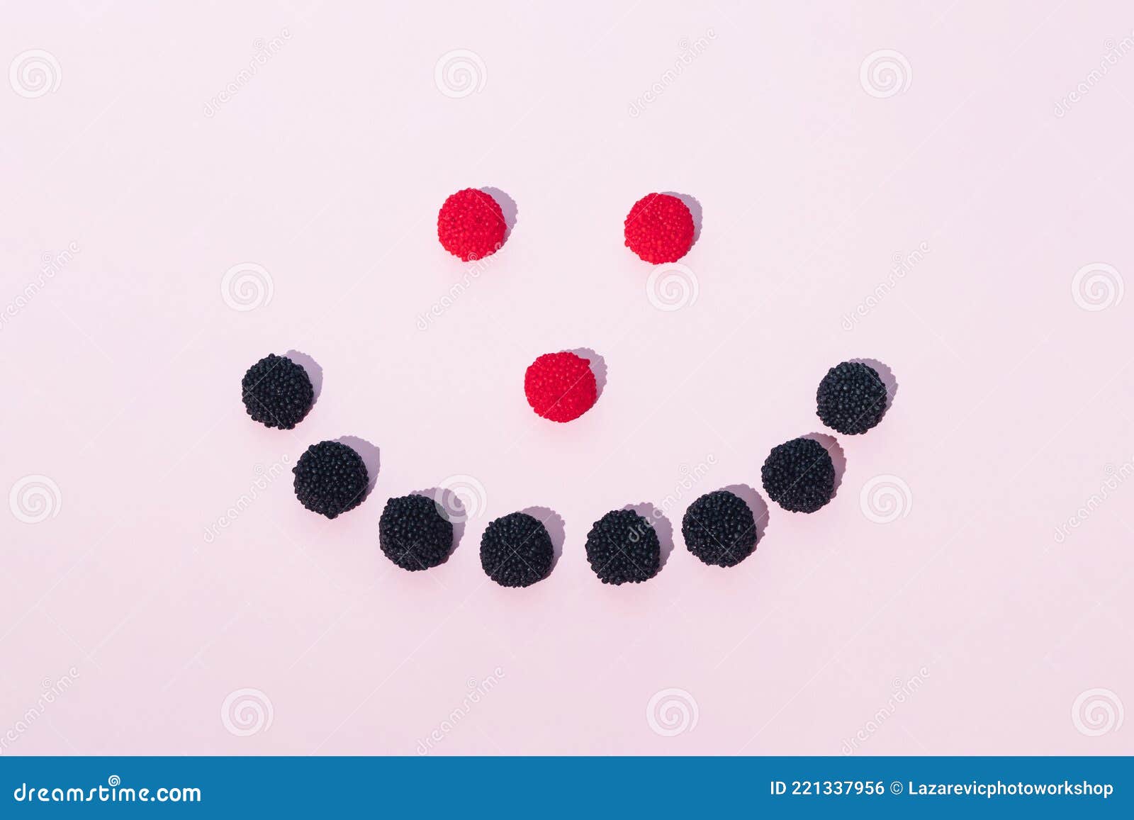 Smiley Candy Face in the Shape of Blackberries and Raspberries Stock ...