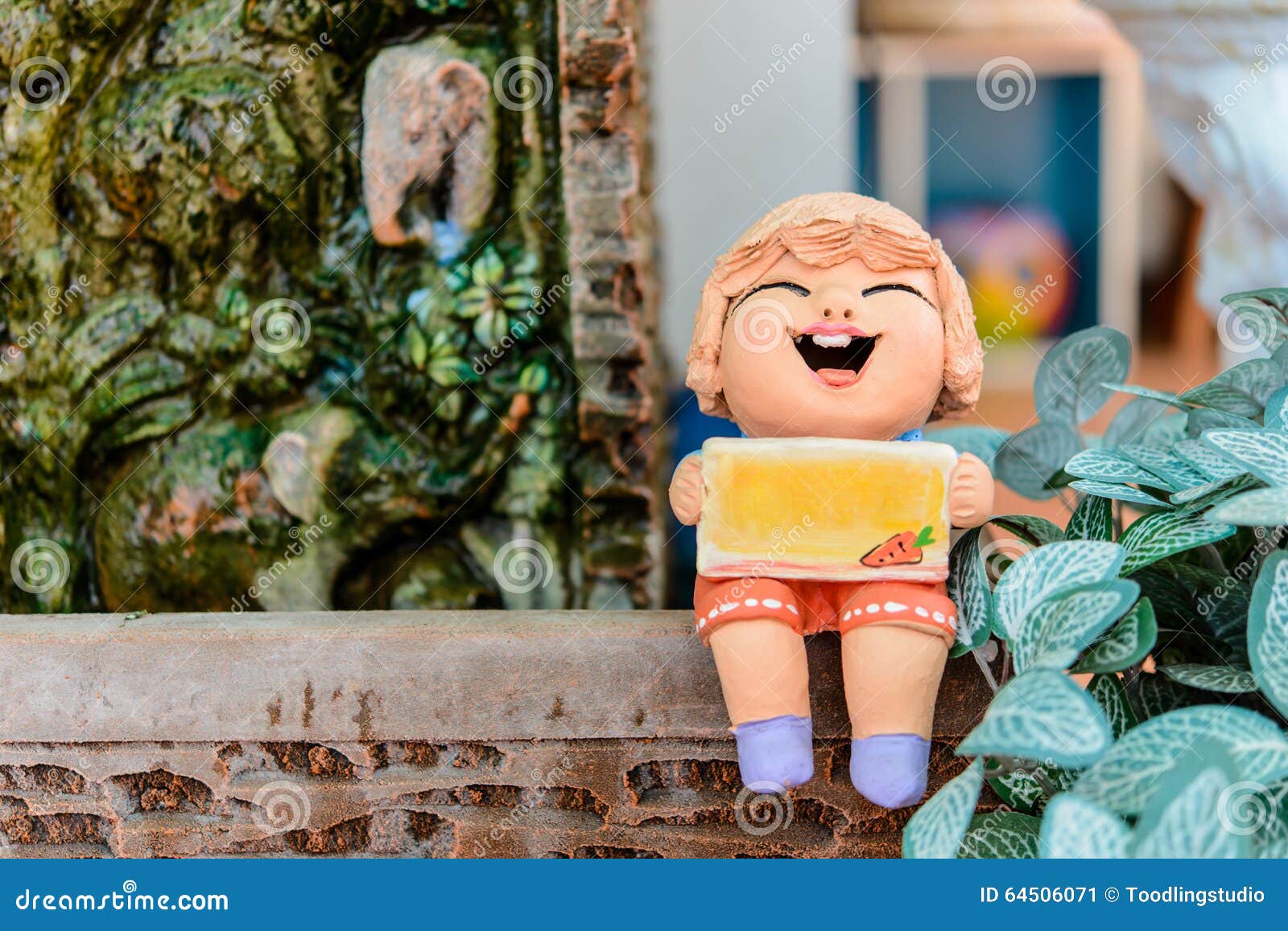 Smiley Doll Holding A Blank Signage. Royalty-Free Stock Photography ...