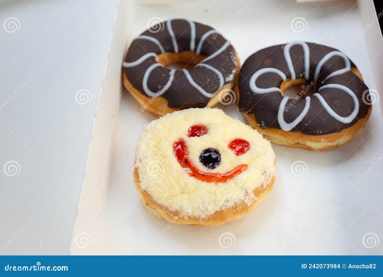 Smiley Face Donuts in a Cardboard Box Stock Photo - Image of donuts ...