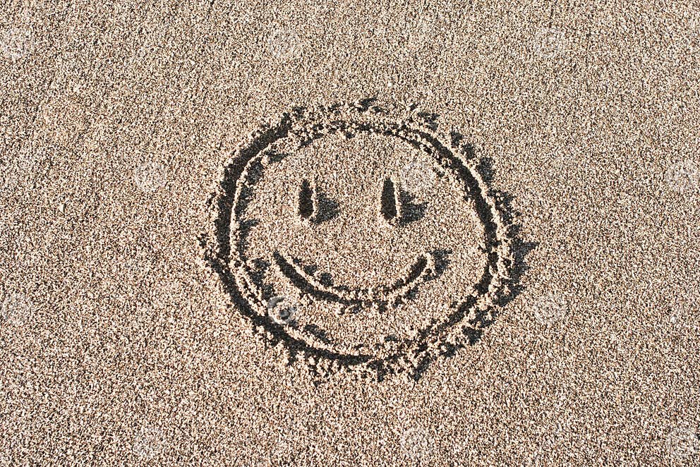 Smiley Face Drawn on Beach Sand Stock Photo - Image of impression ...