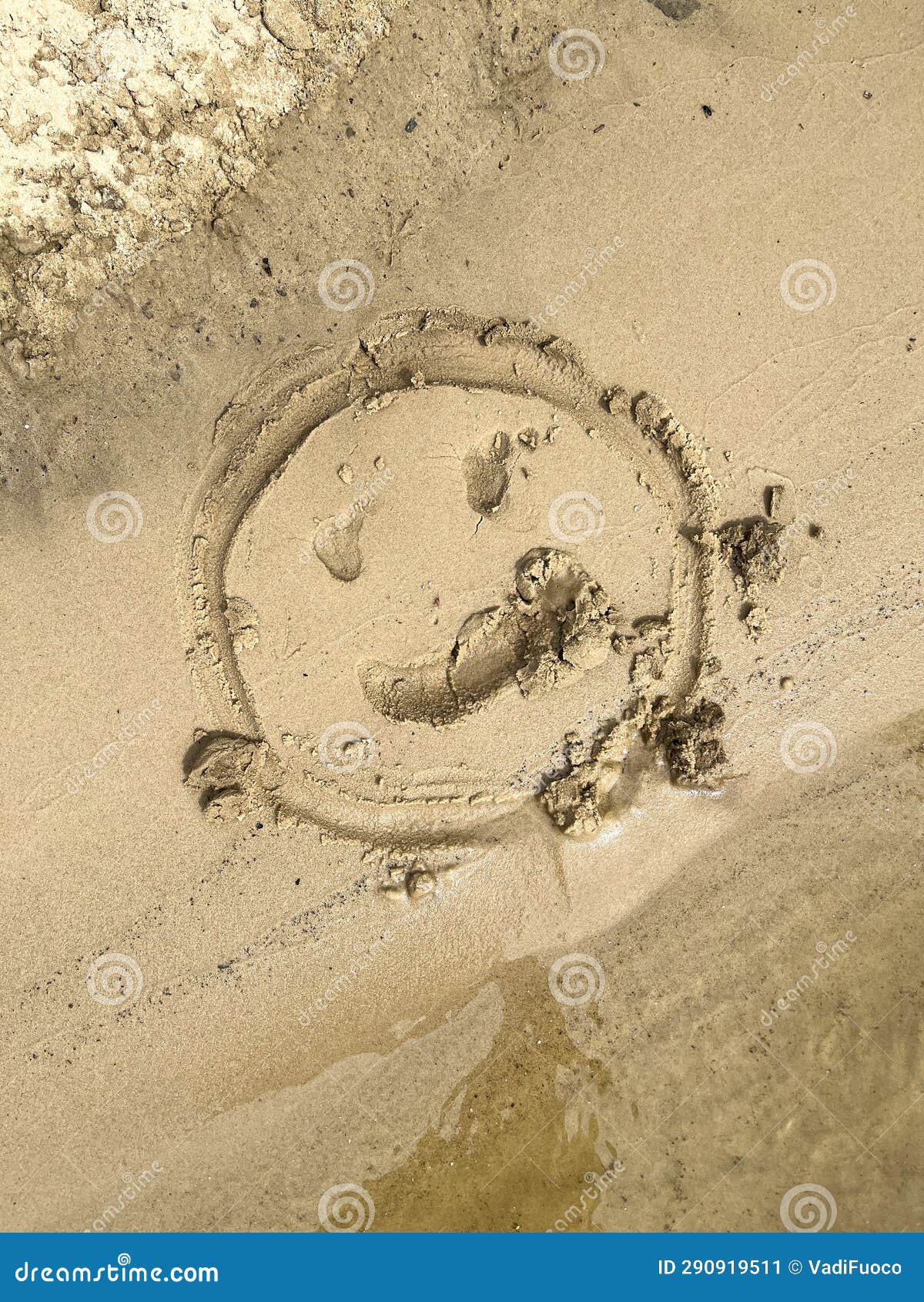 A Smiley Face Drawn on the Sand by the Sea Stock Image - Image of ...