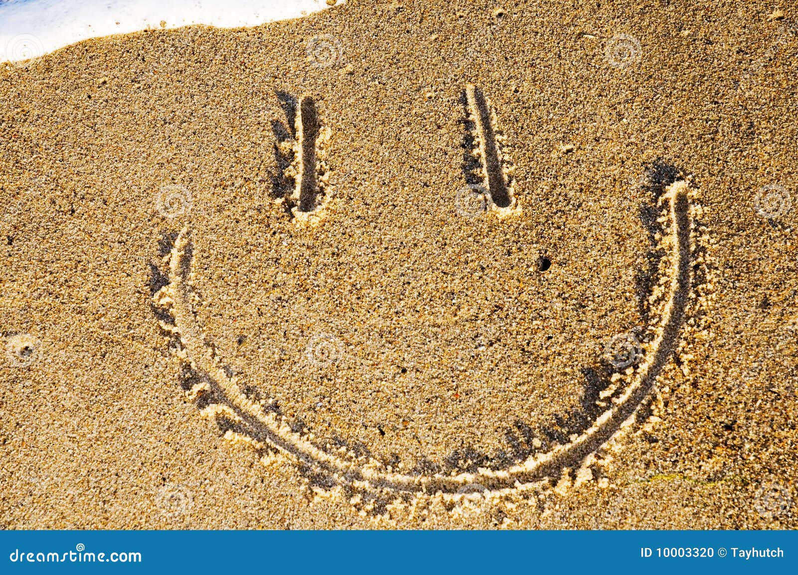Smiley Face In The Sand Stock Photo | CartoonDealer.com #10003320