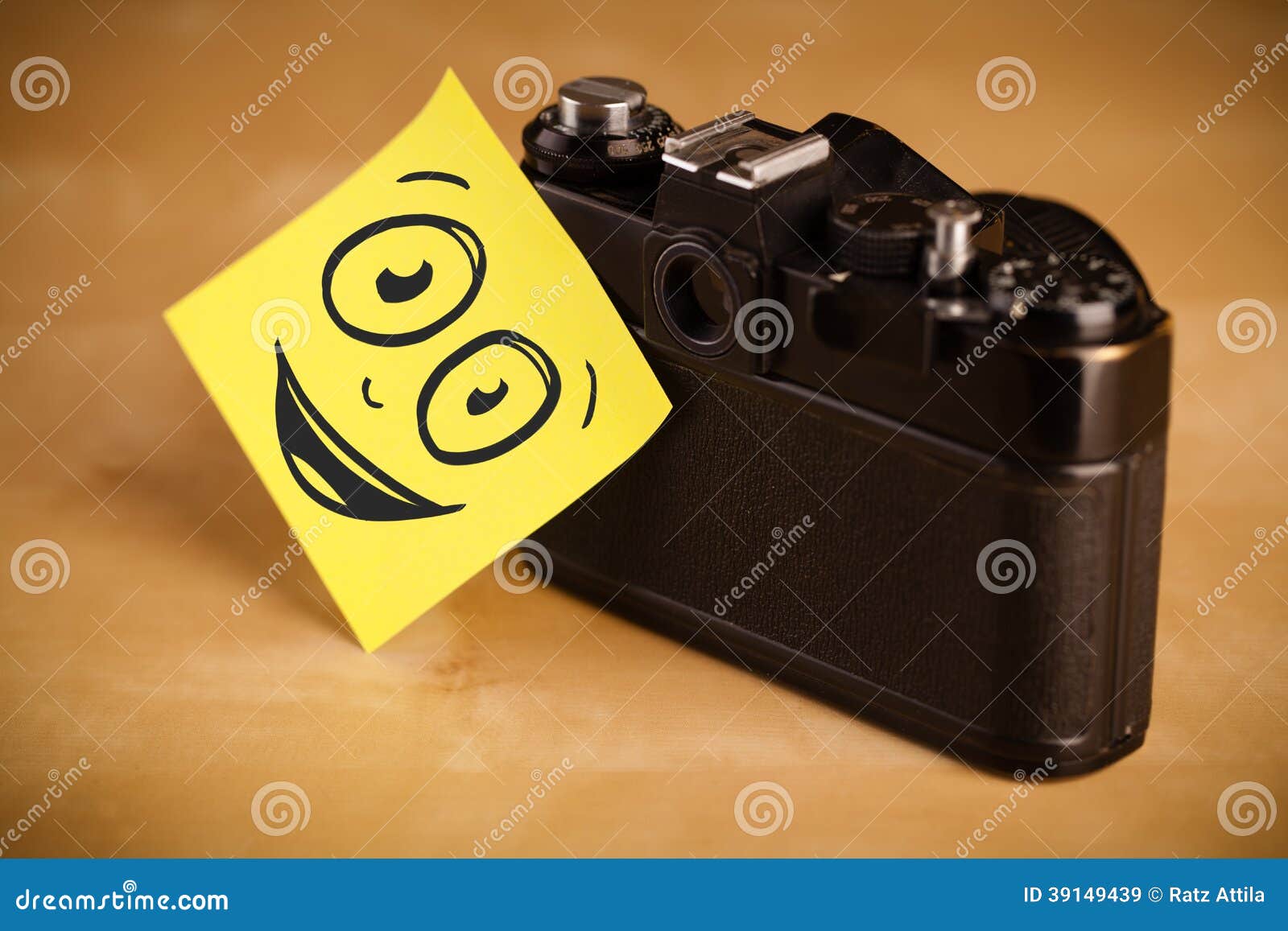 Smiley Face Sticked on Photo Camera Stock Image - Image of draw ...