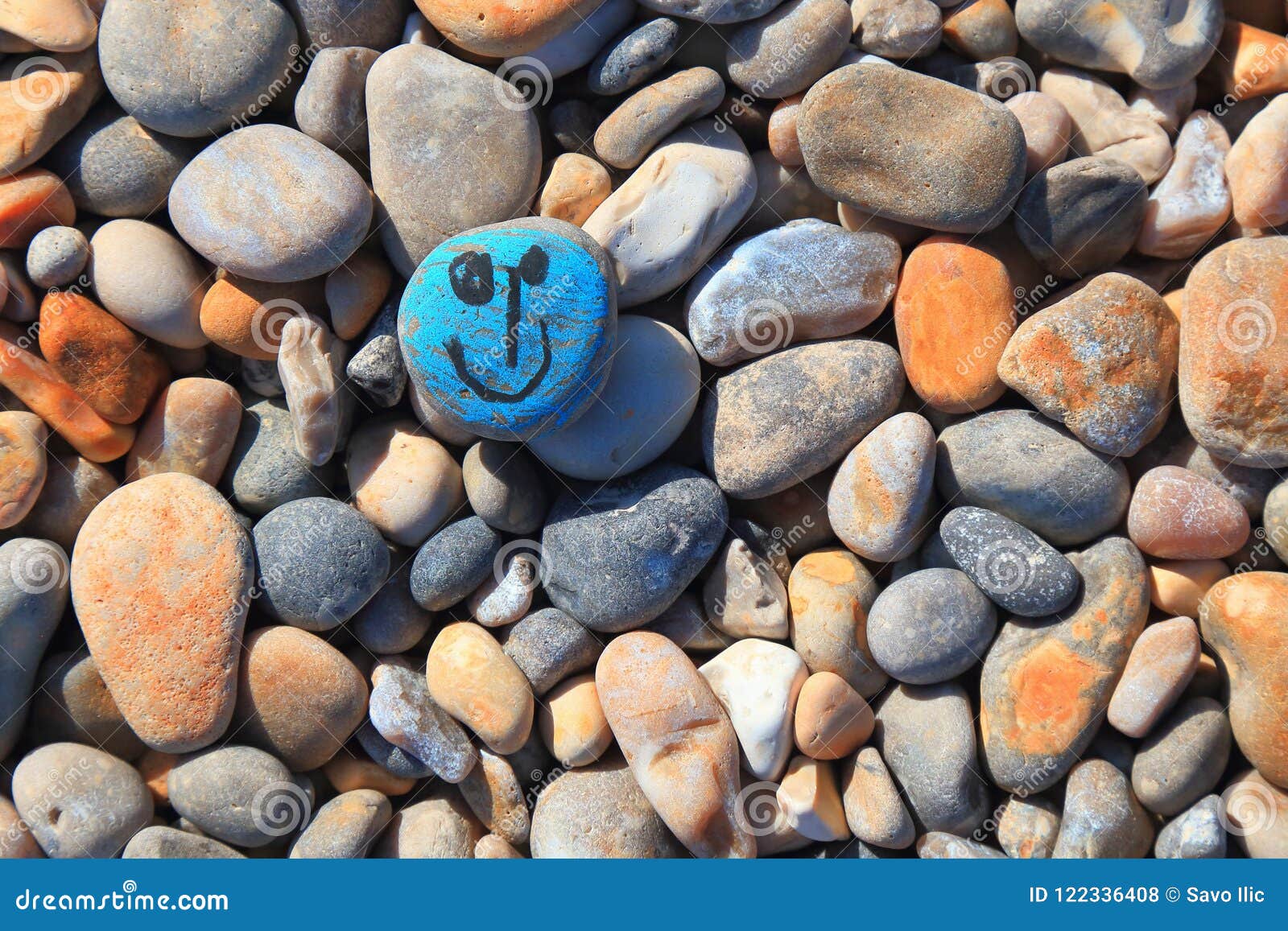 Smiley face on the stone stock photo. Image of shape - 122336408