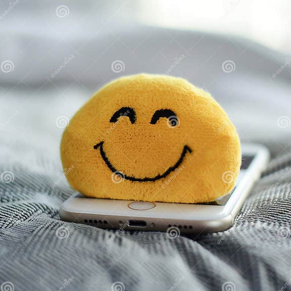 Smiley Face Using Smartphone for Instant Communication Stock ...