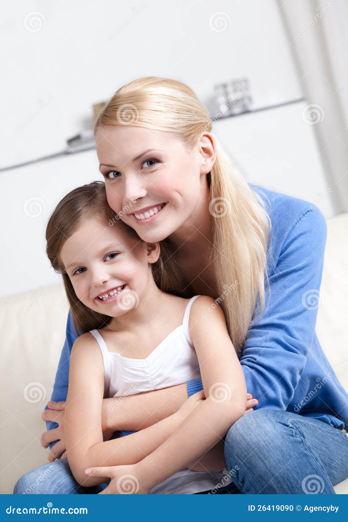 Smiley Mom with Her Daughter Stock Photo - Image of living, child: 26419090