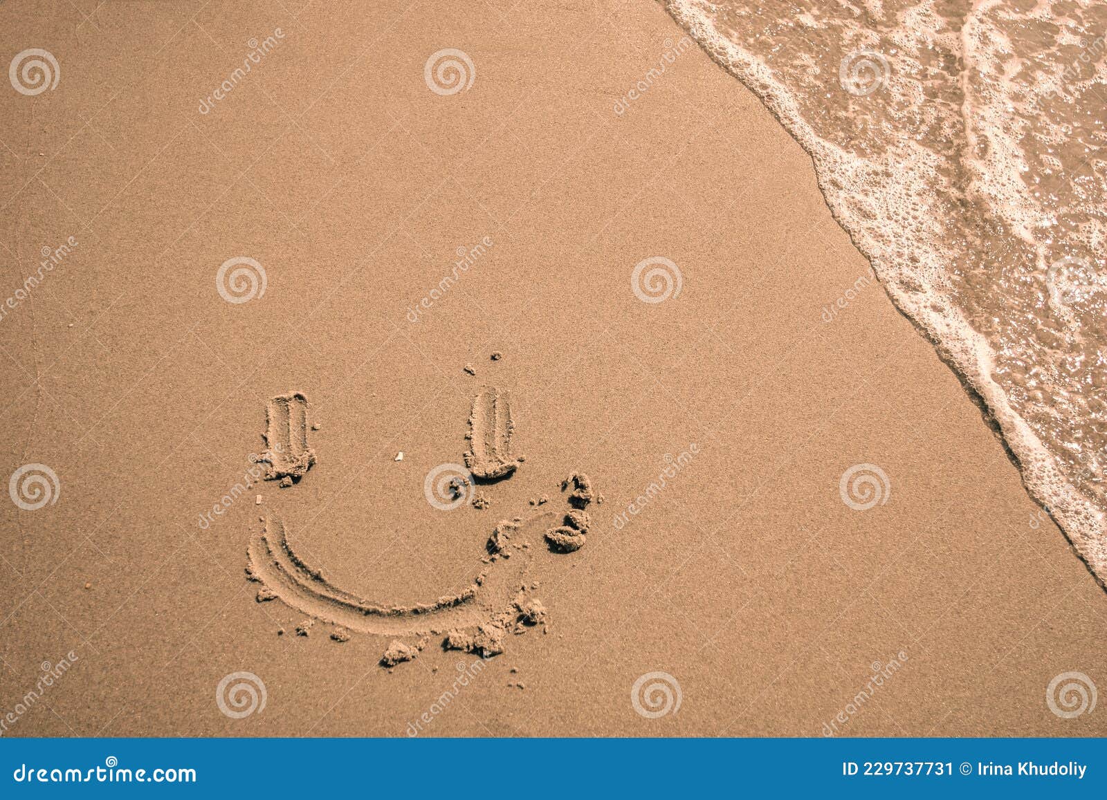 Smiley on the sand stock image. Image of postcard, rest - 229737731