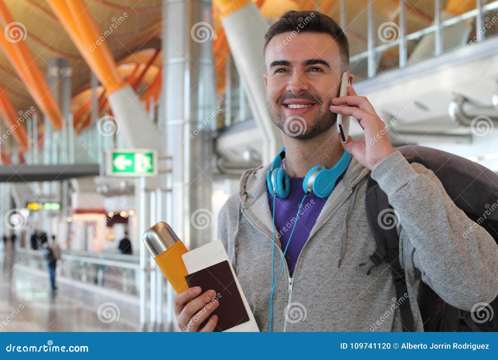 Smiley Traveler Calling from the Airport Stock Photo - Image of cell ...