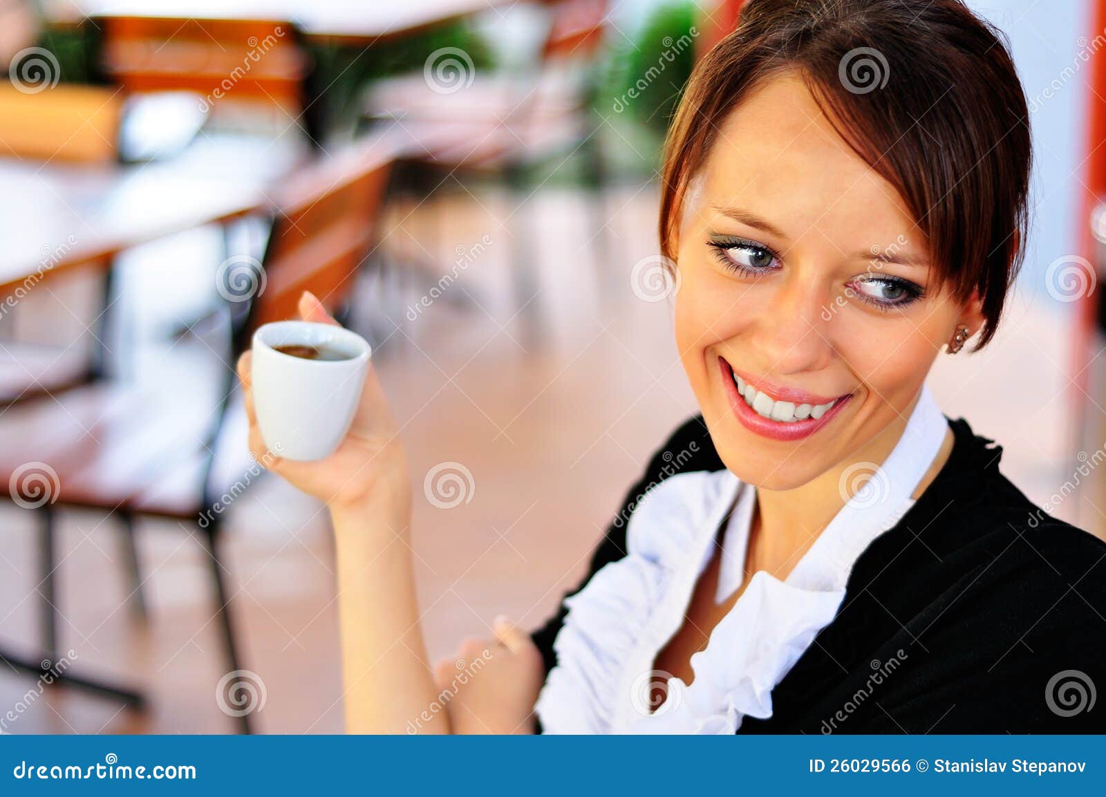 Smiley Woman Holding a Cup of Coffee in a Hand Stock Photo - Image of ...
