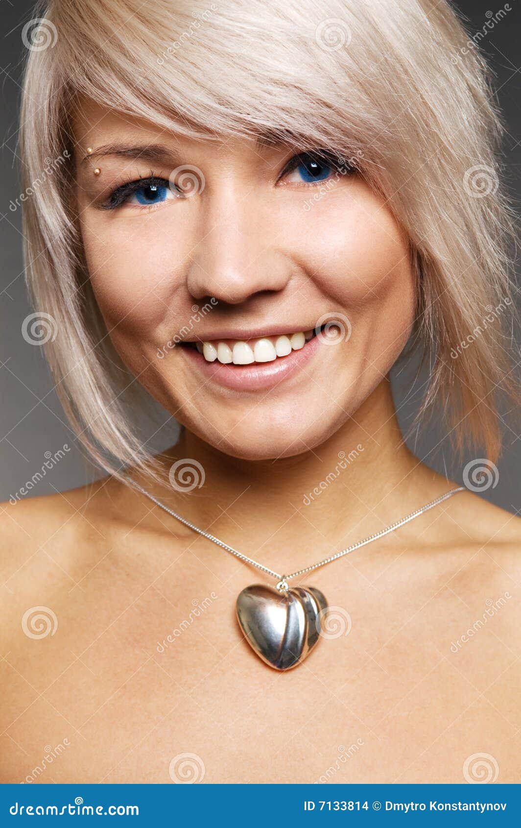 Smiley Woman with Silver Heart Stock Photo - Image of beautiful, glamor ...