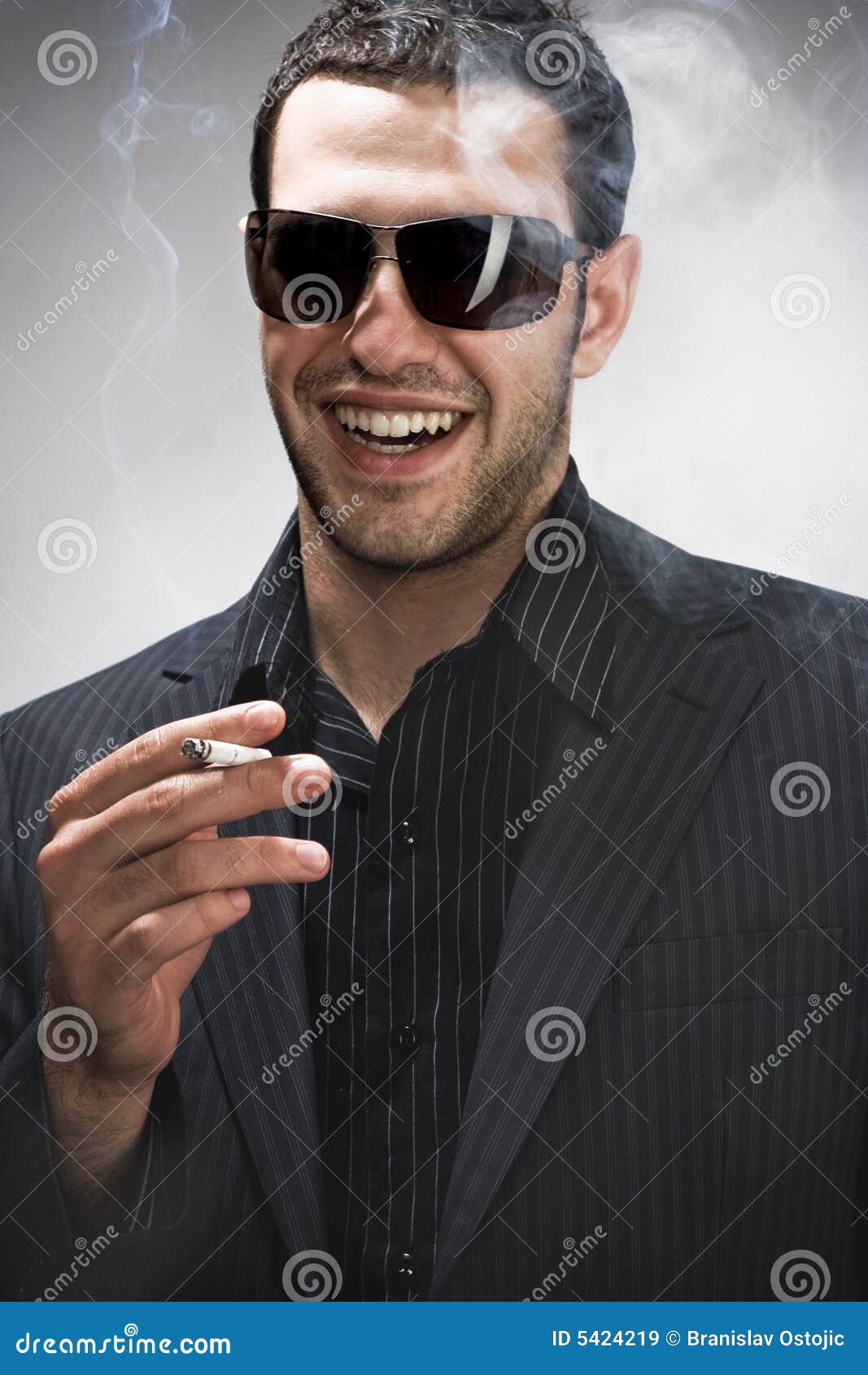 Smiling stock image. Image of vertical, smiling, cigarette - 5424219