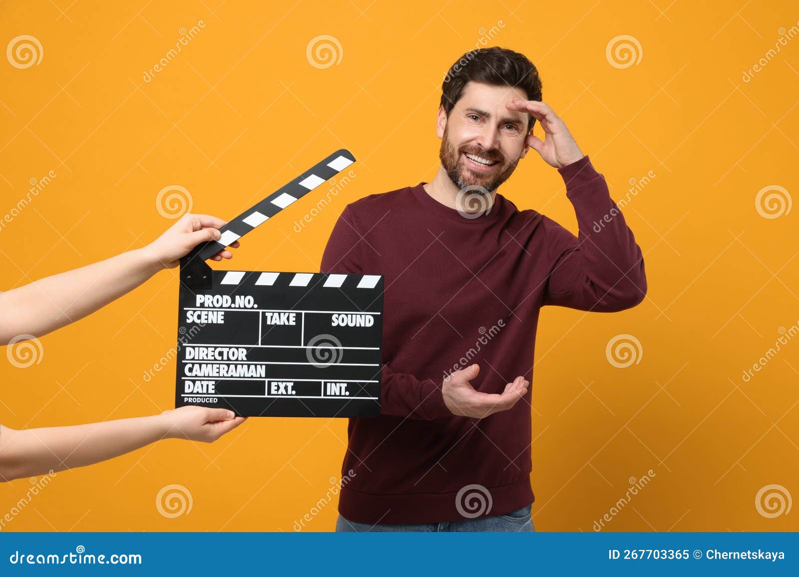 Smiling Actor Performing while Second Assistant Camera Holding ...
