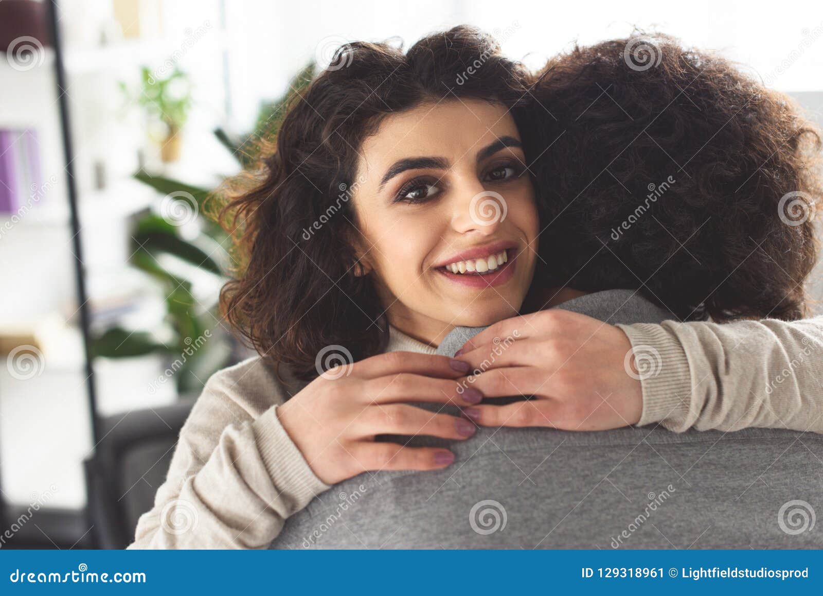 Smiling Affectionate Couple Cuddling Stock Image - Image of casual ...