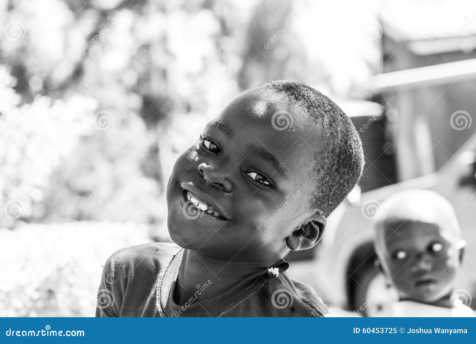Smiling African Children Sitting In The Grass At Maasai Mara National ...