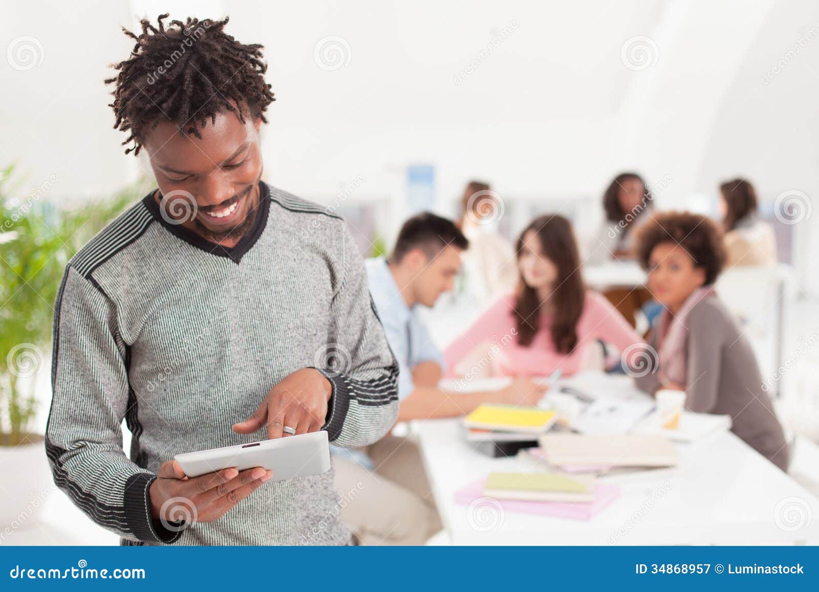 Smiling African College Student Using a Tablet Stock Image - Image of ...