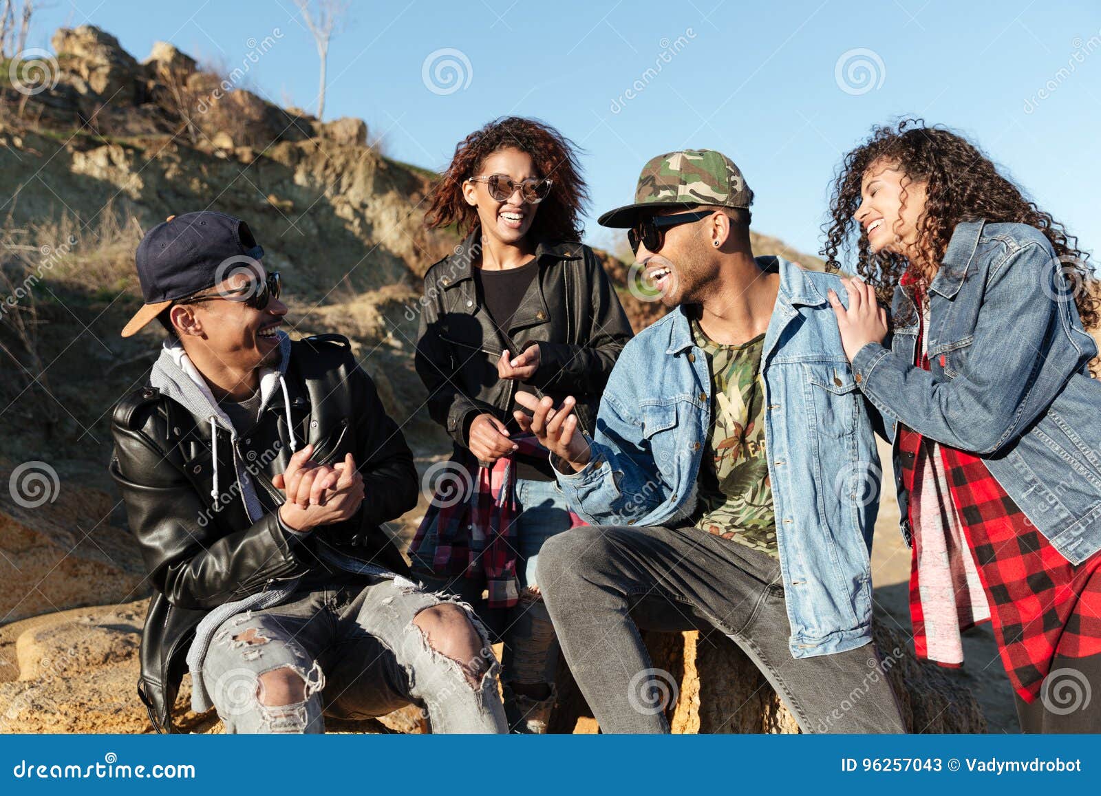 Smiling African Friends Walking Outdoors on the Beach. Stock Image ...