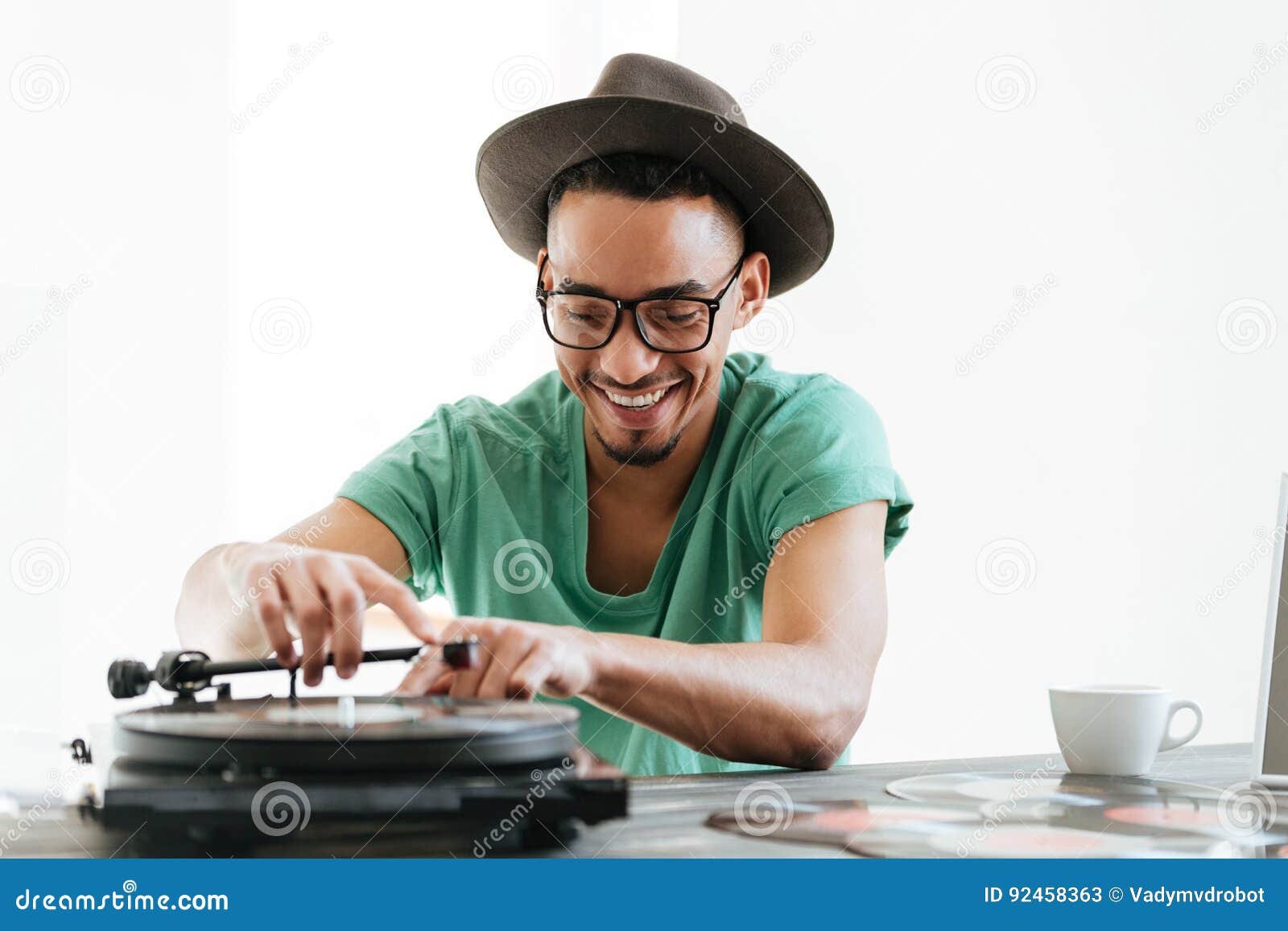 Smiling African Man in T-shirt Using Record-player Stock Image - Image ...