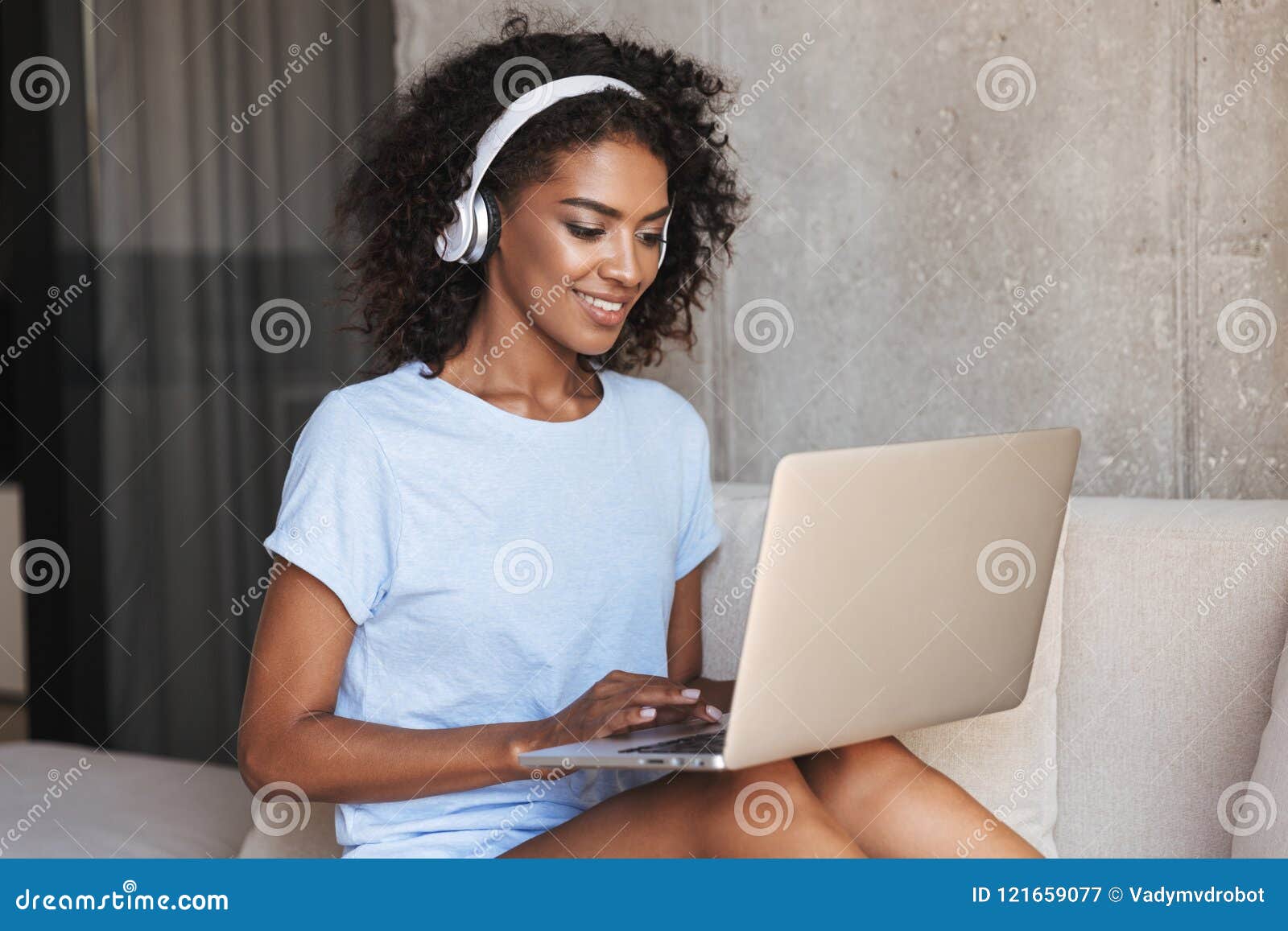 Smiling African Woman In Headphones Using Laptop Stock Image Image Of
