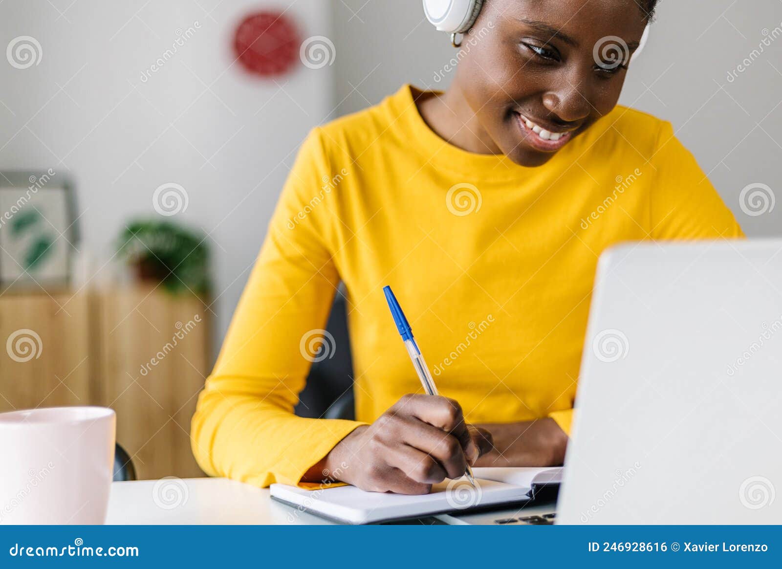 Smiling African Woman Student Using Laptop Computer for Online Learning ...