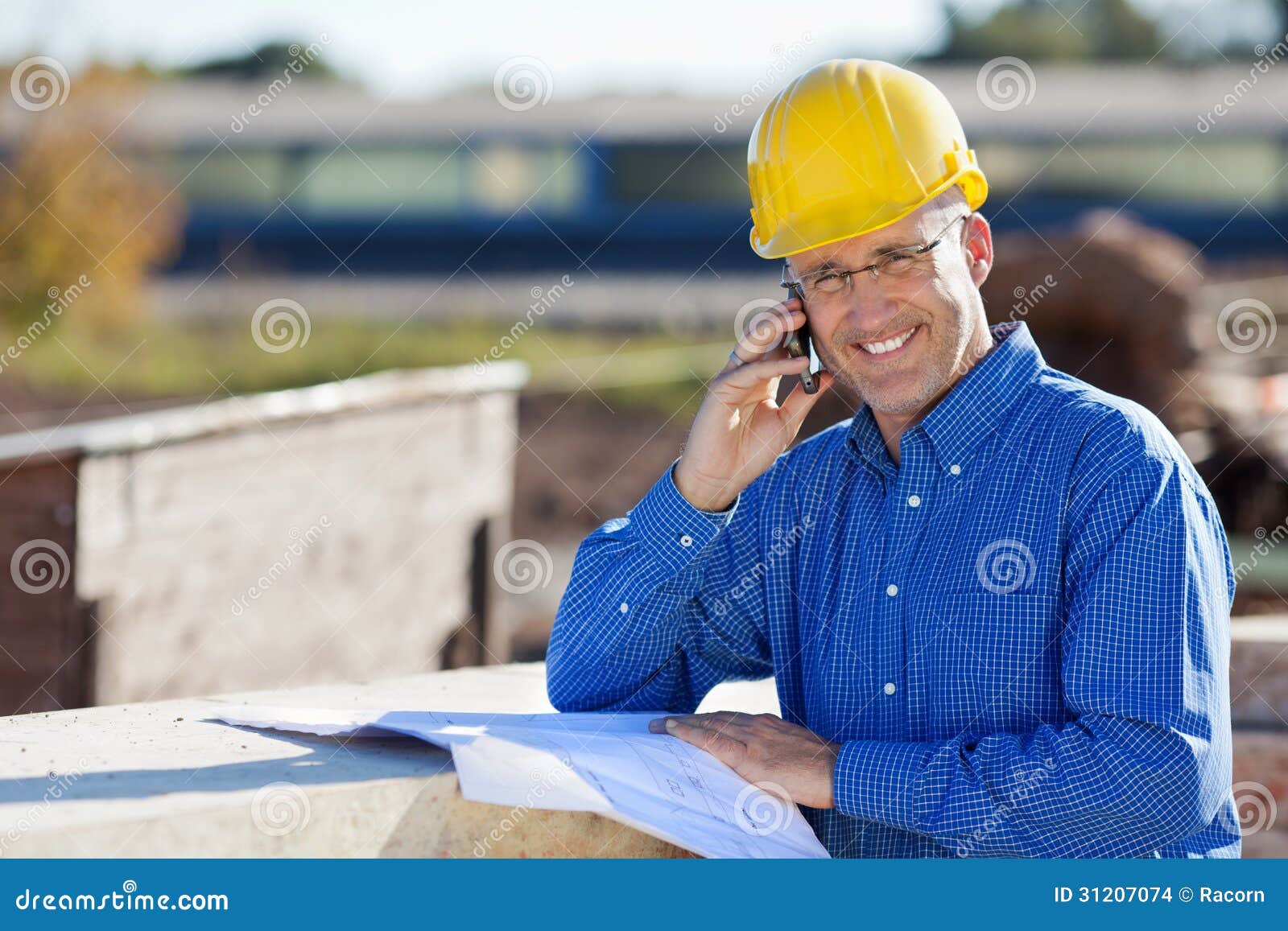 Smiling Architect Using Mobile Phone at Site Stock Photo - Image of ... Smiling Architect Using Mobile Phone at Site Stock Photo - Image of ...