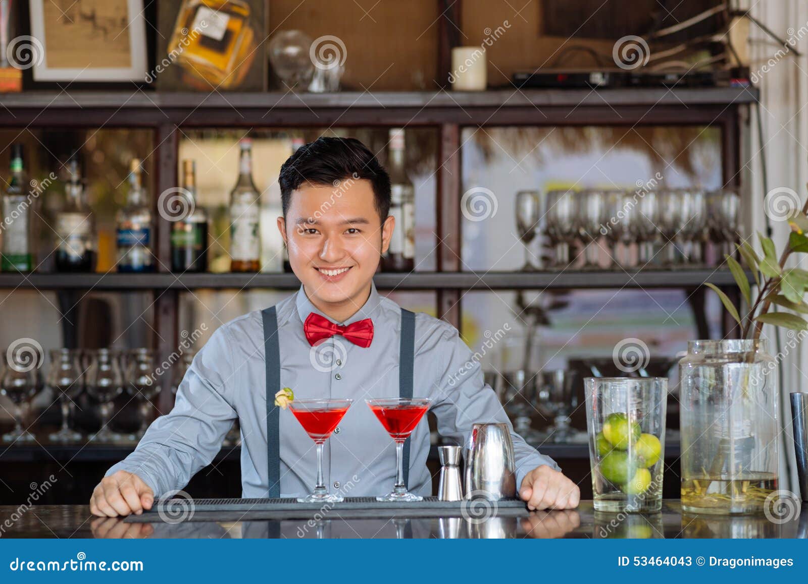 Smiling Asian bartender stock image. Image of drink, portrait - 53464043