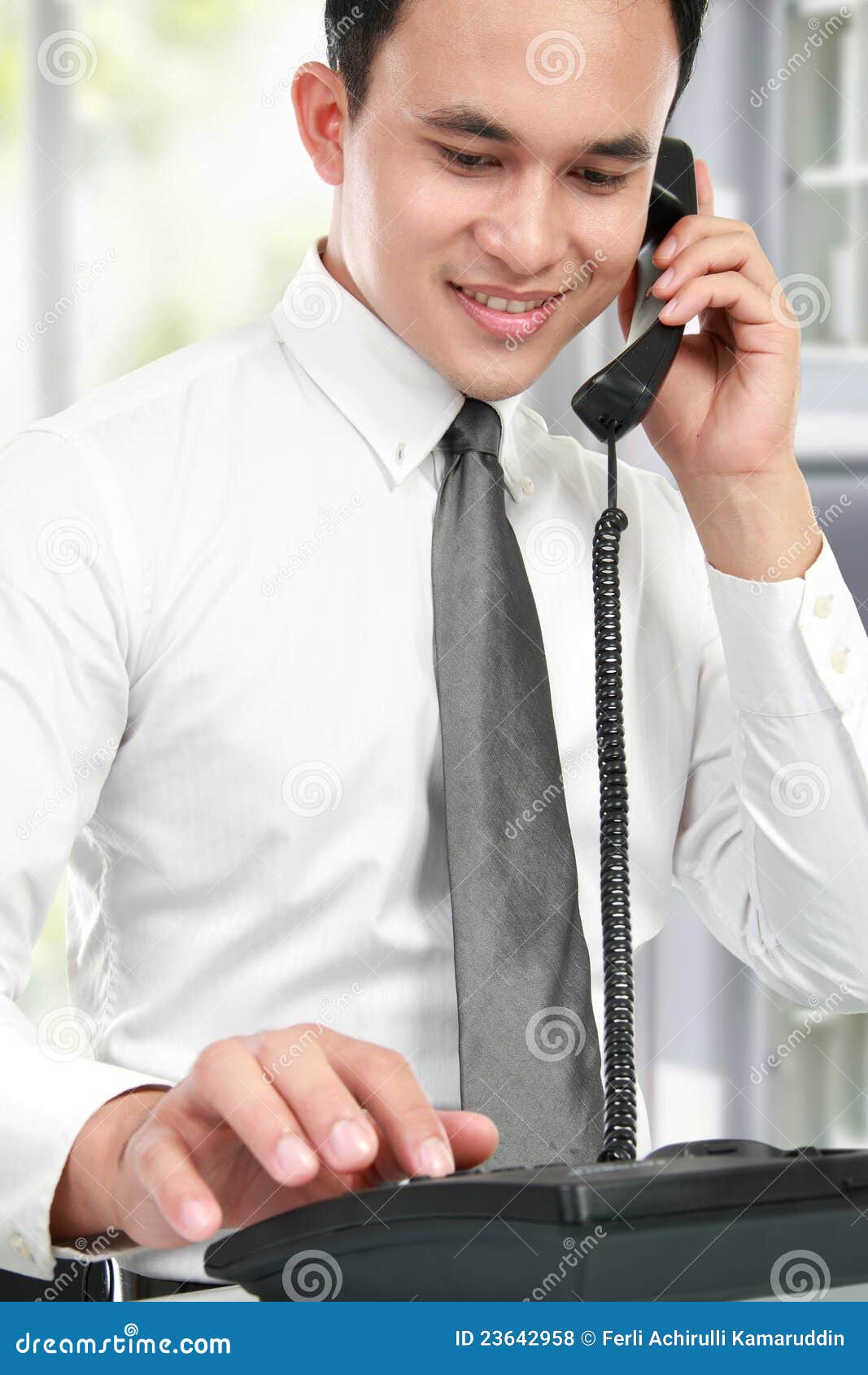 Smiling Asian Business Man Reading a Report Stock Photo - Image of male ...