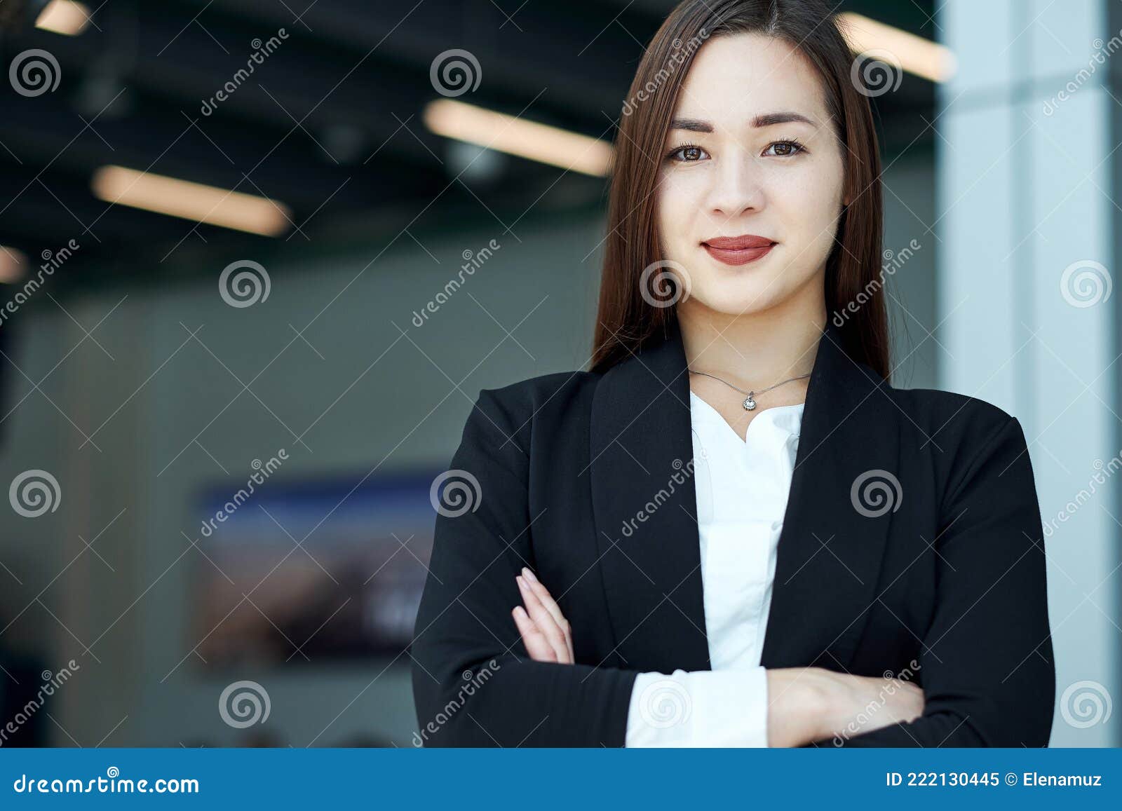 Smiling Asian Business Woman in Modern Office or Meeting Room. Crossed ... Smiling Asian Business Woman in Modern Office or Meeting Room. Crossed ...